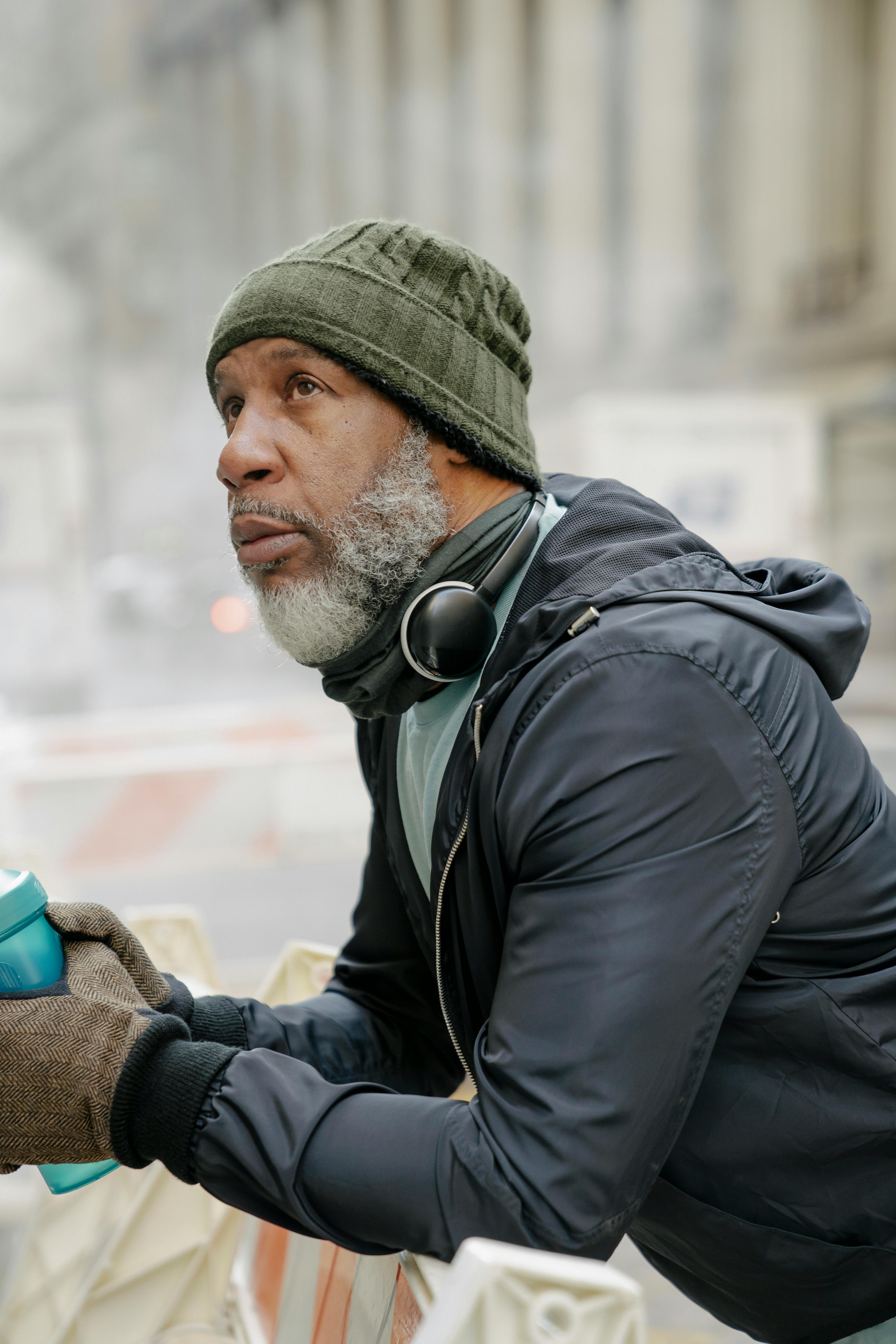 Photo of an Old Man Walking in the Alley · Free Stock Photo