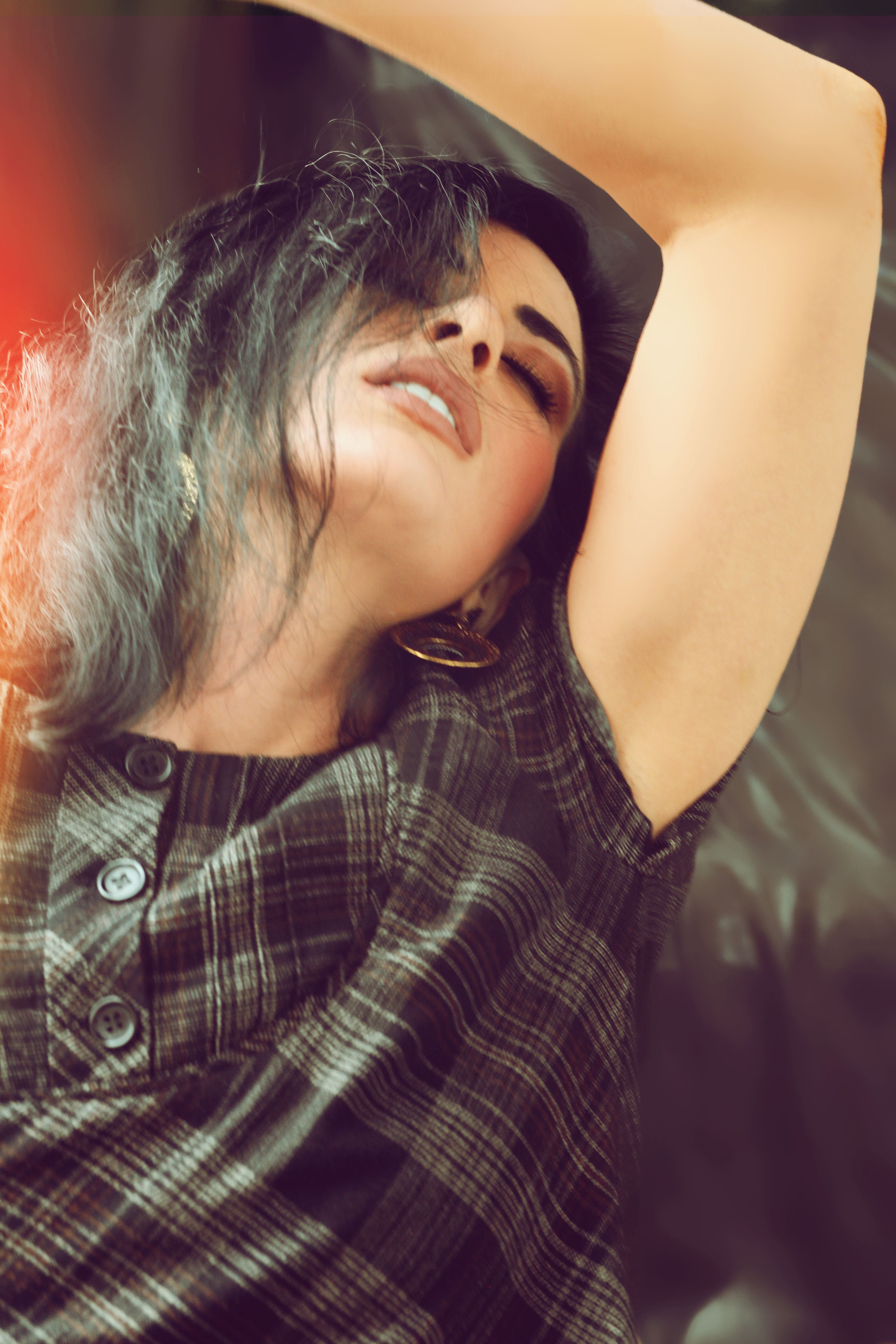 Low-Angle Shot of a Girl in Denim Shorts Posing · Free Stock Photo