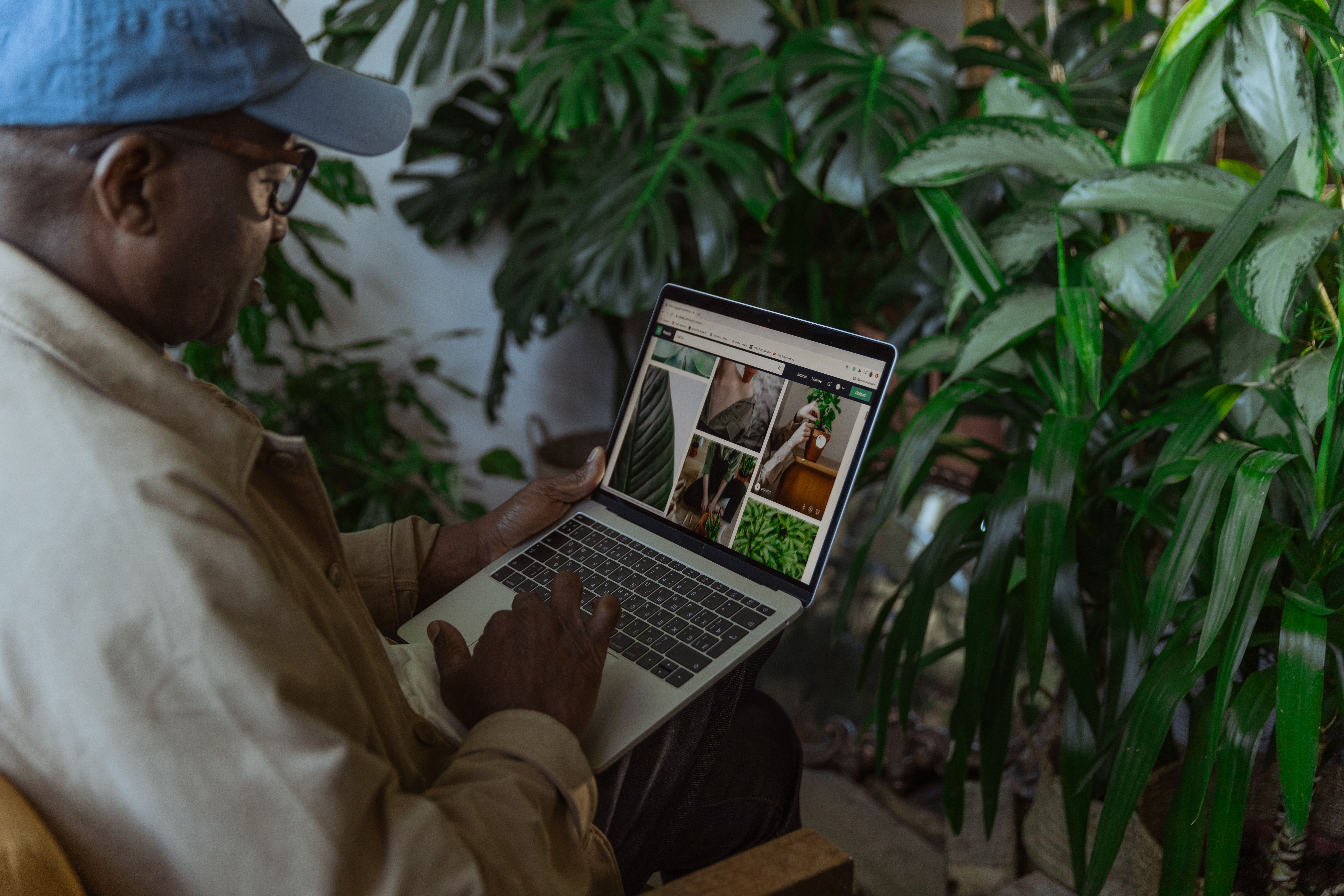 Photo of an Elderly Man Browsing the Internet · Free Stock Photo