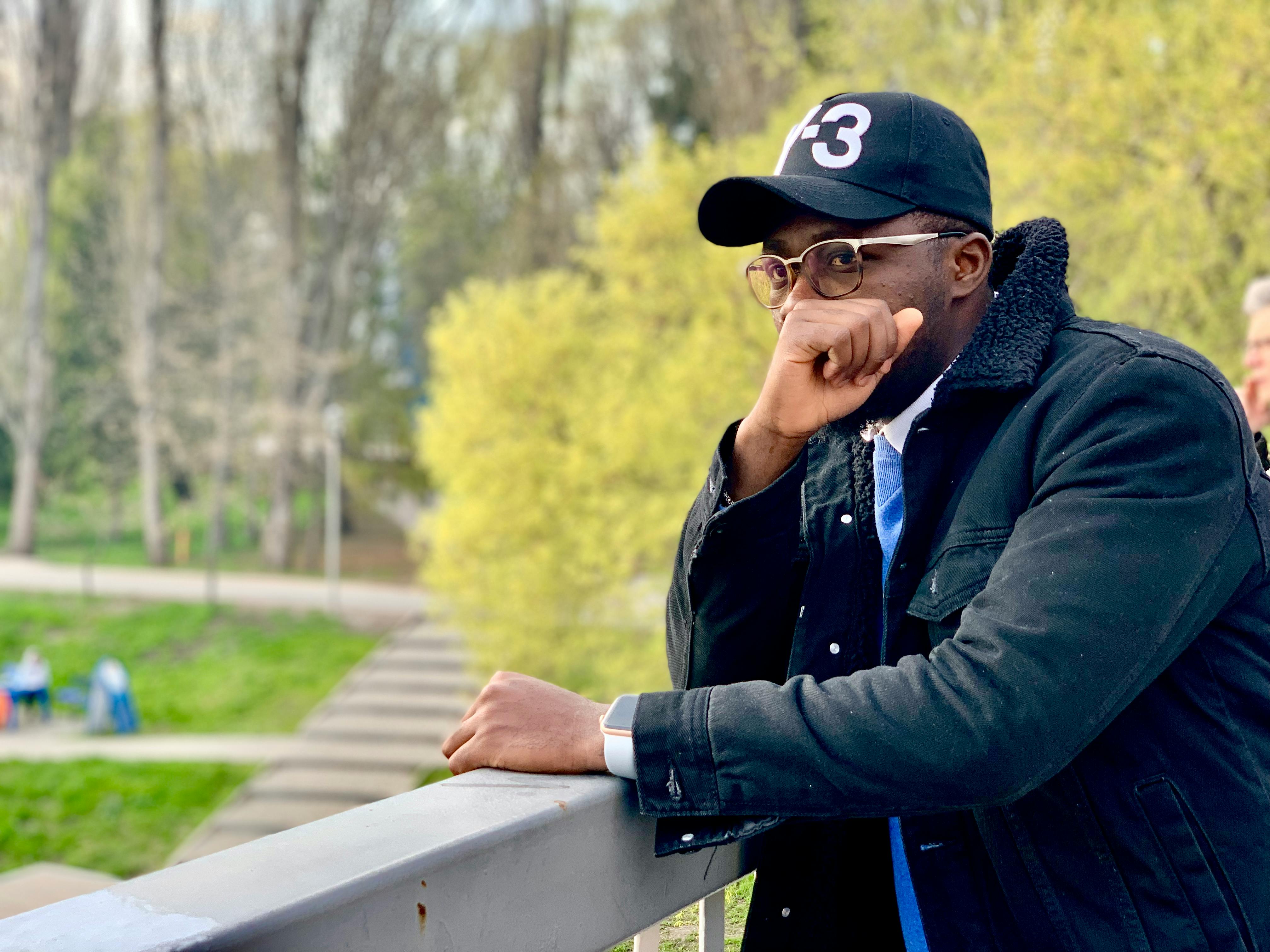 A Man Wearing Cap and Black Jacket · Free Stock Photo