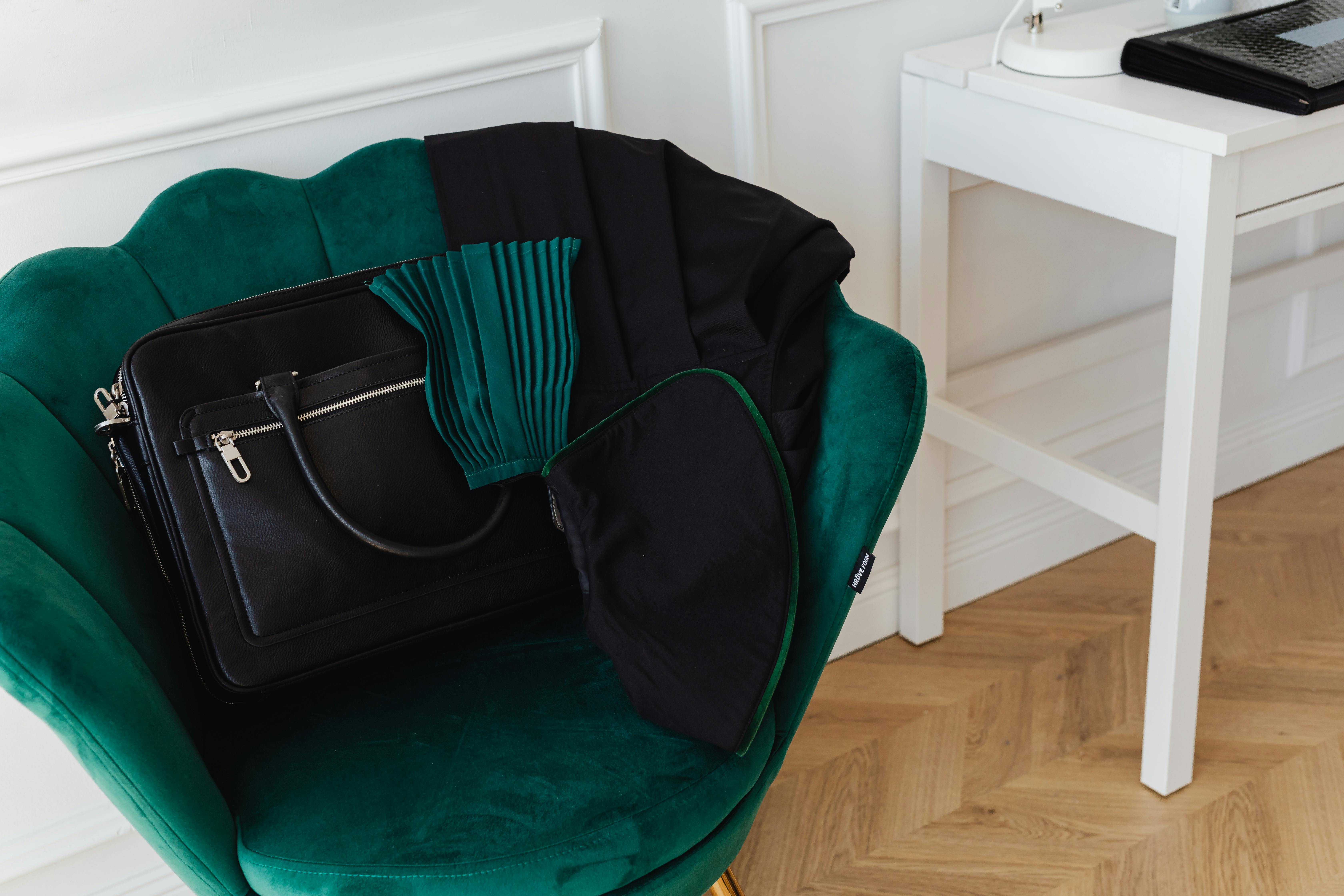 Black Leather Handbag on the Accent Chair · Free Stock Photo