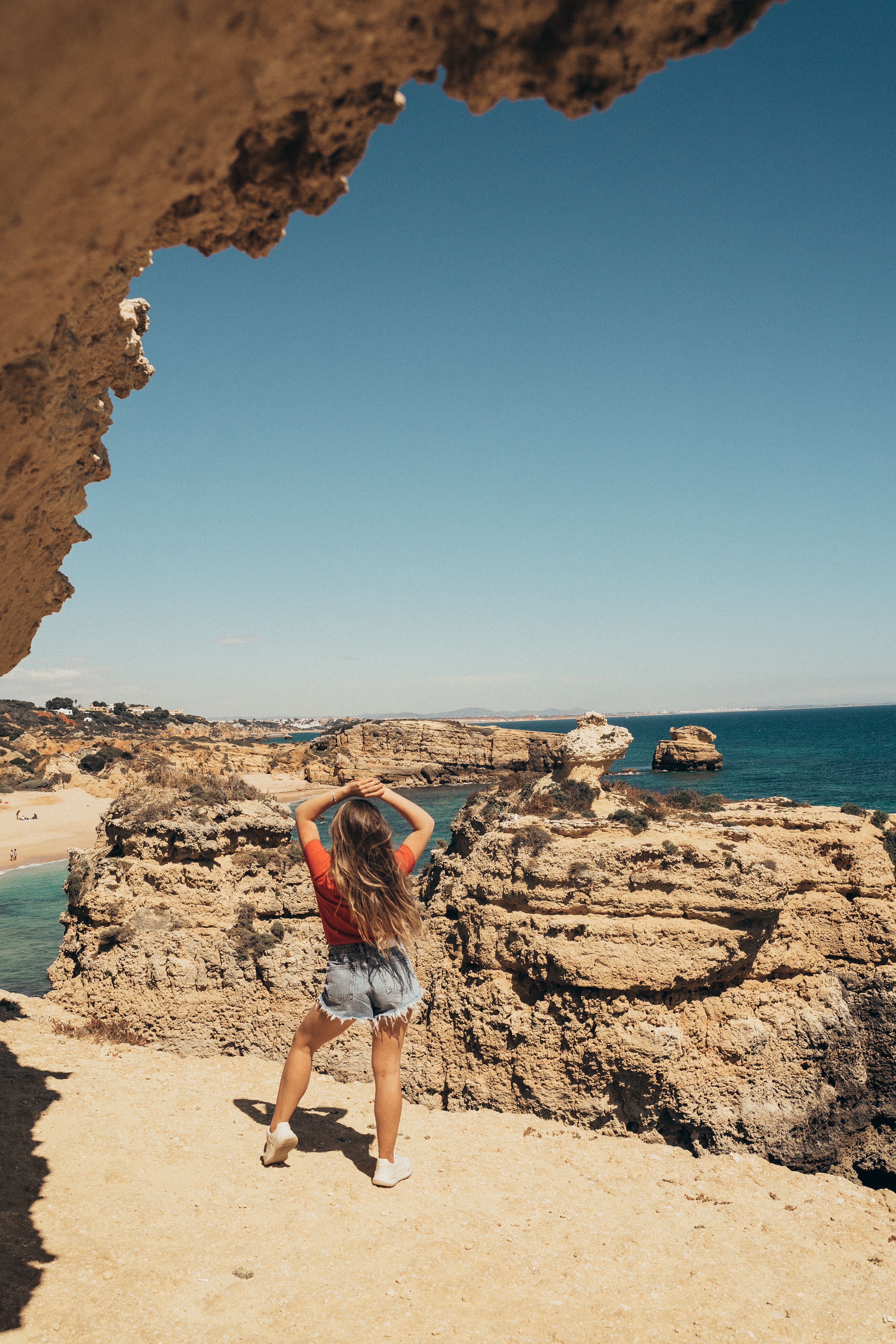 A Woman Standing on the Cliff · Free Stock Photo