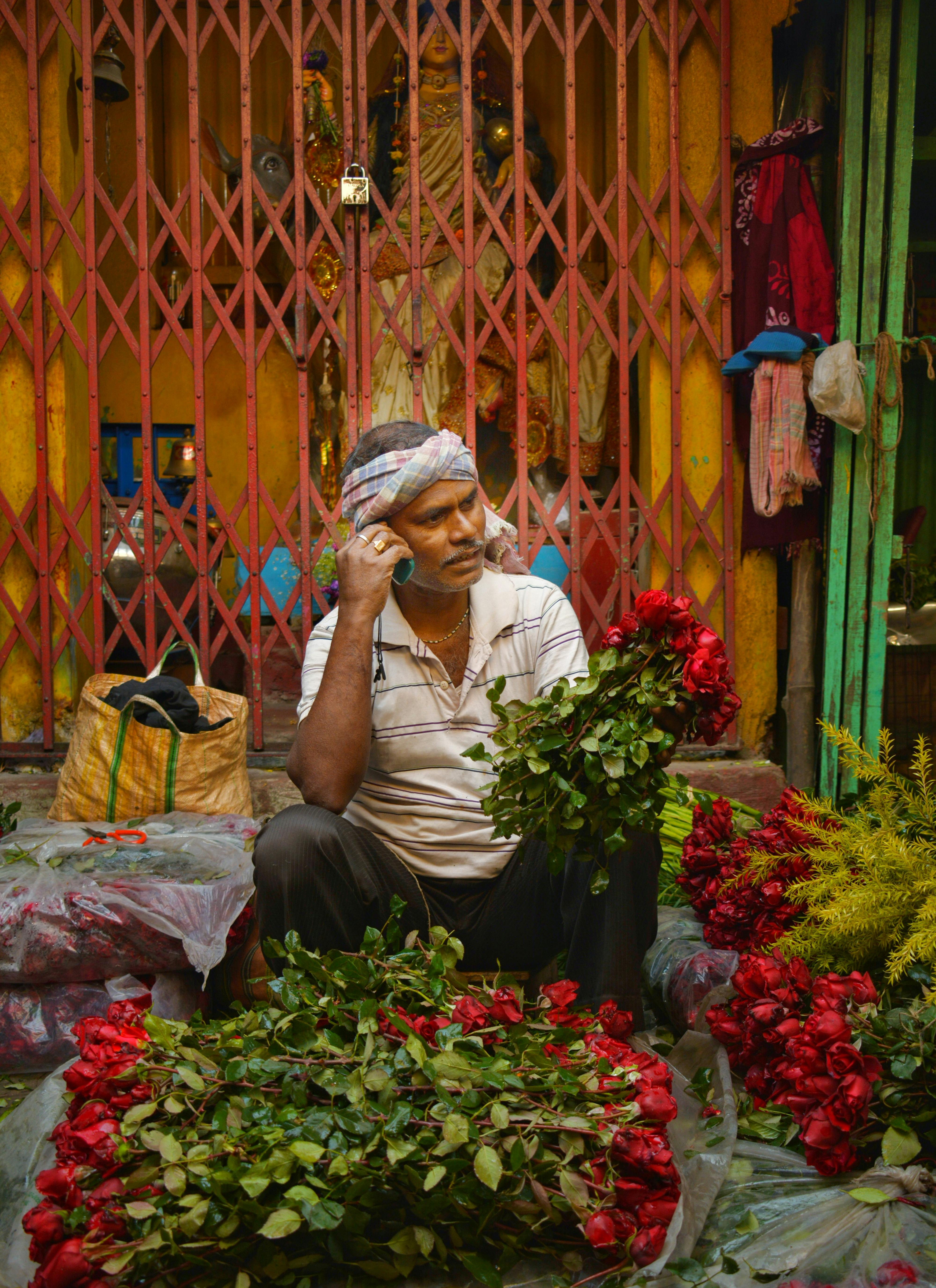 A Man Selling Flowers · Free Stock Photo