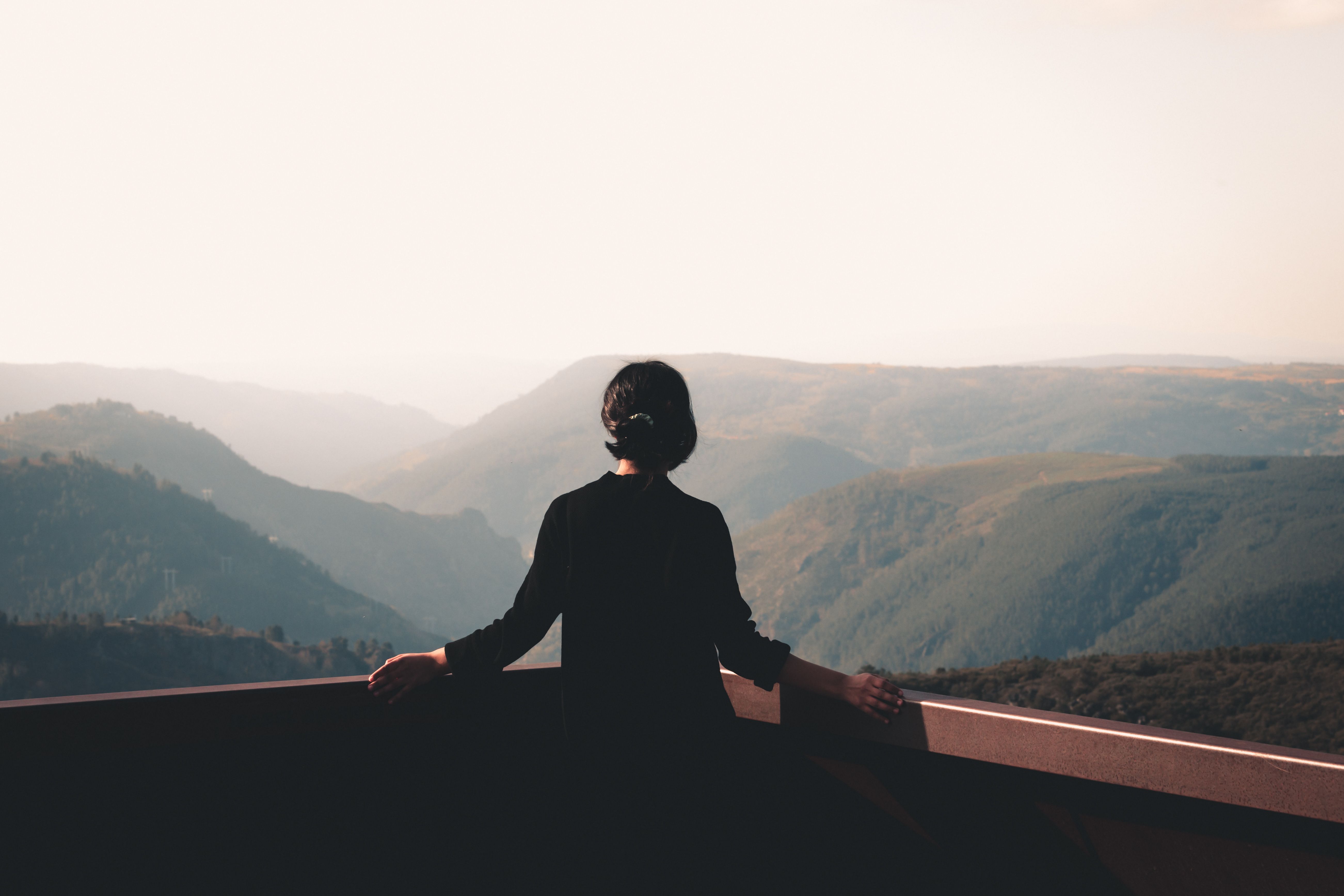 Two People Standing Above a Valley · Free Stock Photo