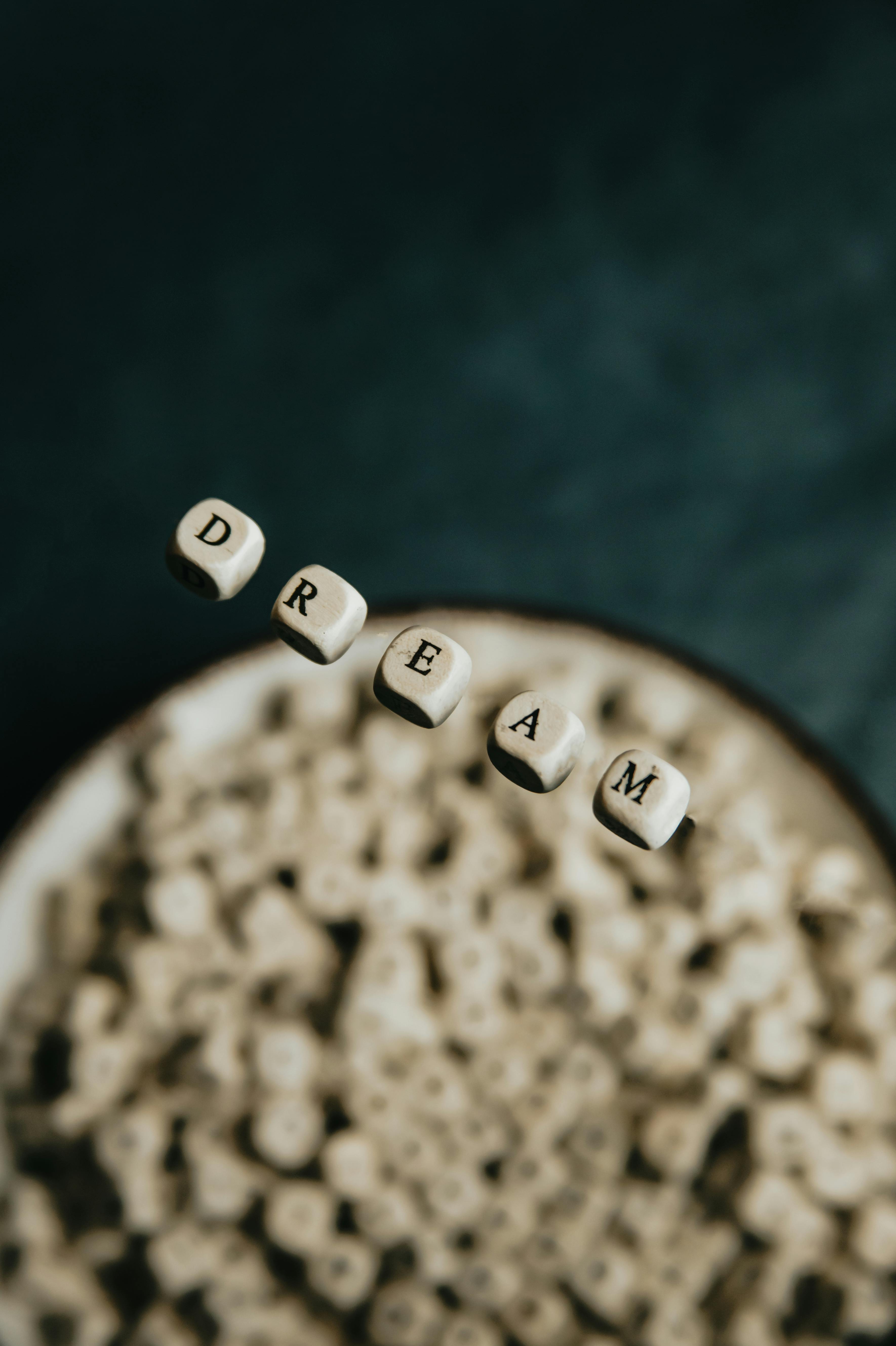 Word Dream Spelled with White Letter Cubes · Free Stock Photo