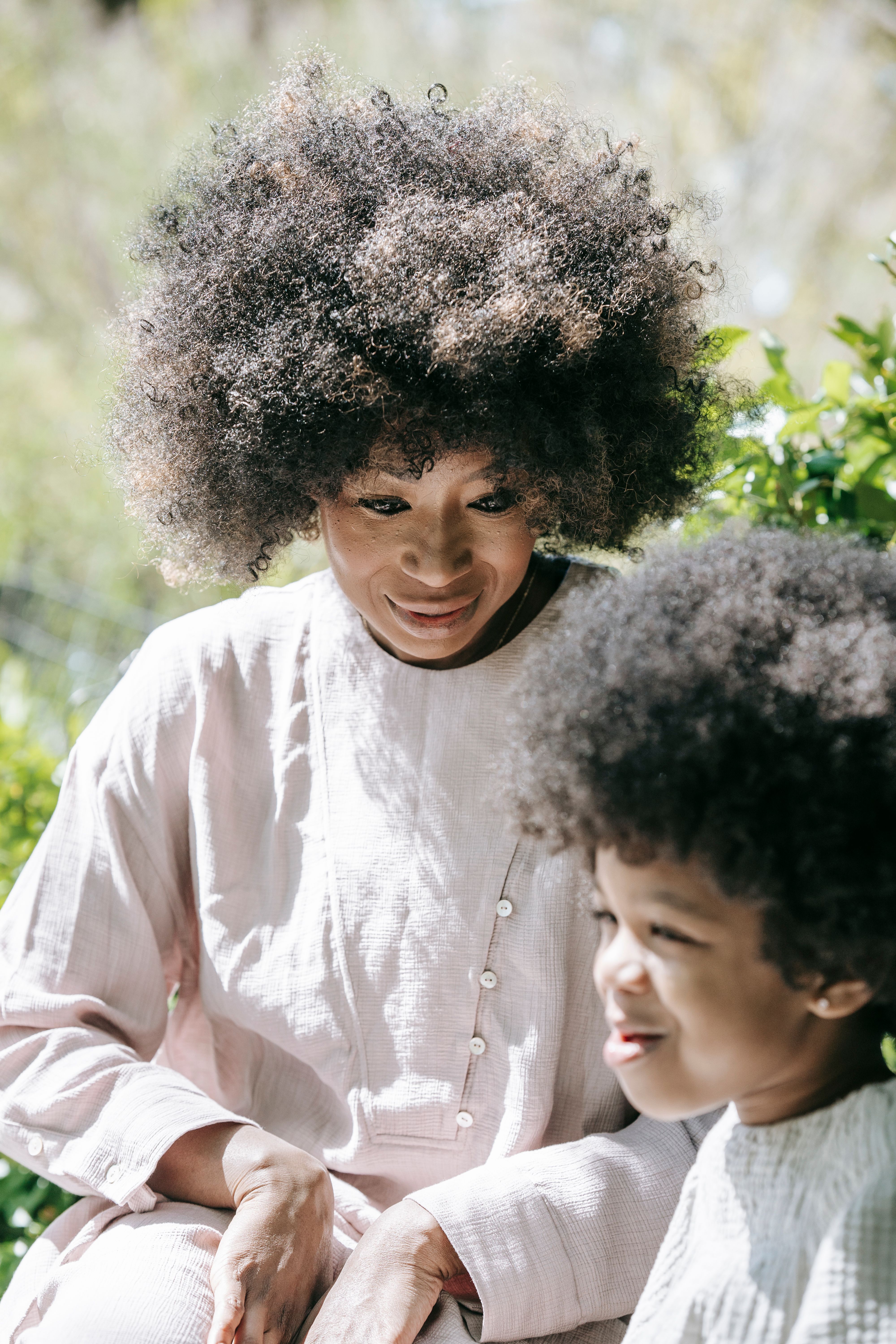 A Mother Looking at Her Child · Free Stock Photo