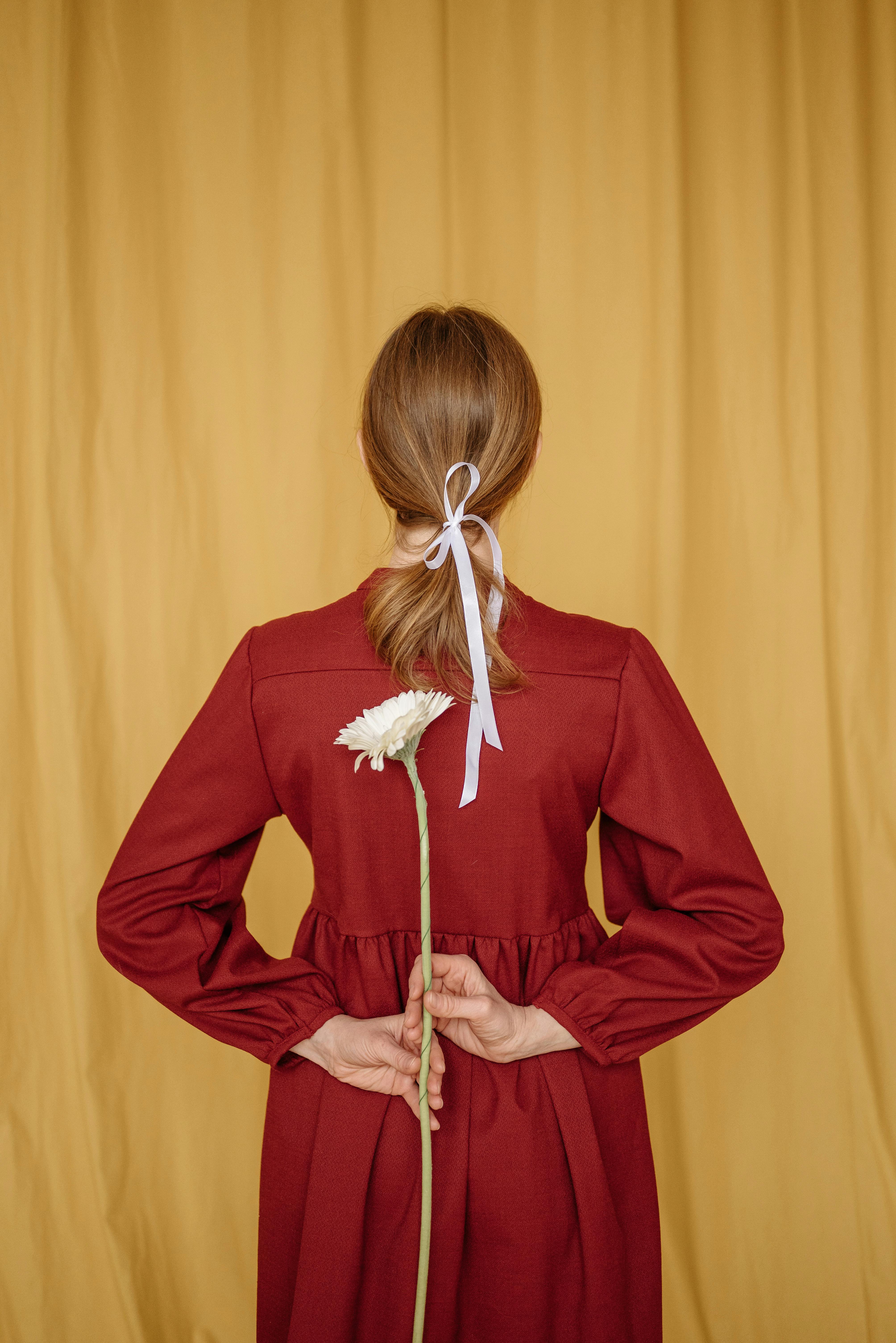 Woman in Rust Colored Long Sleeve Dress · Free Stock Photo
