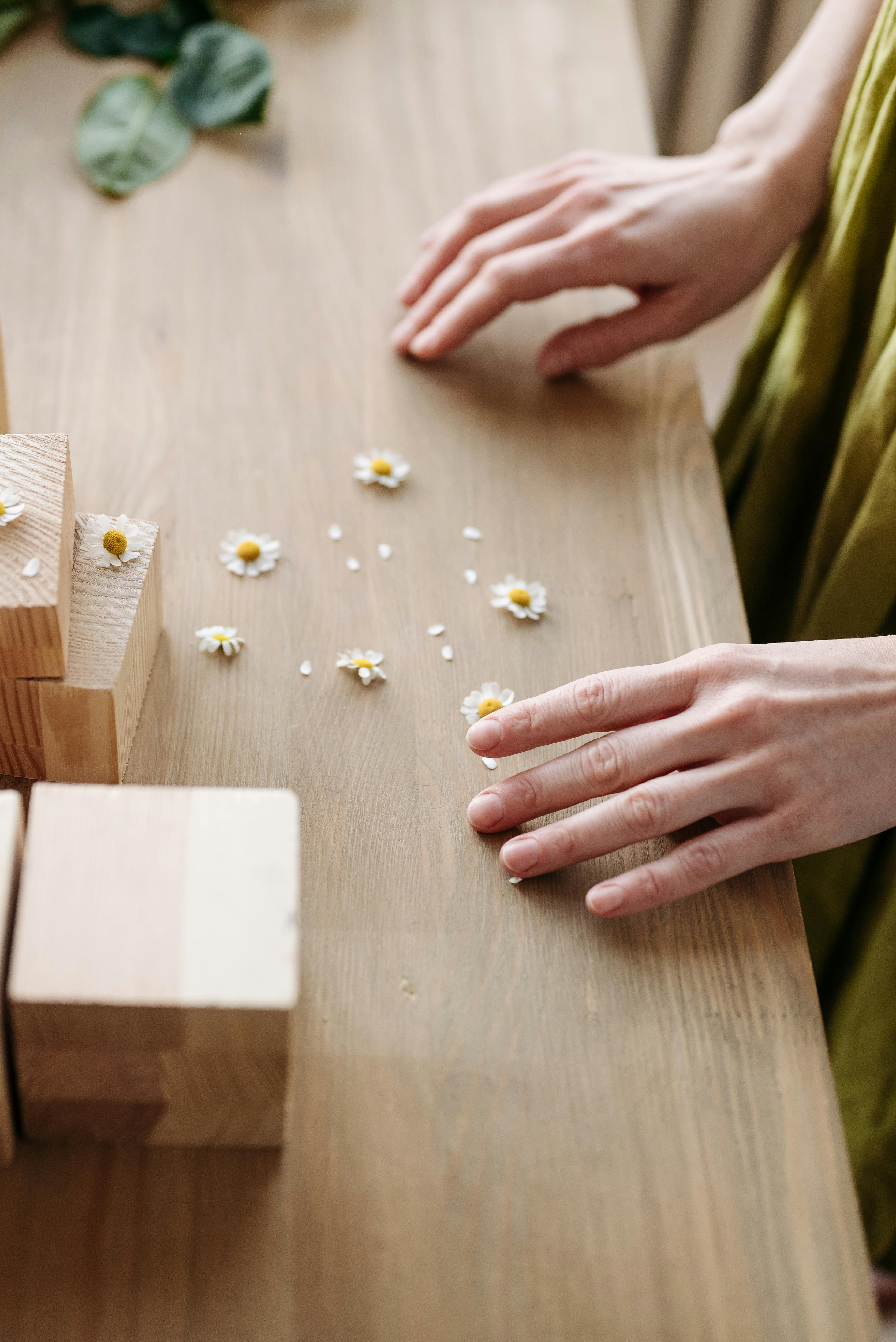 Hands on Wooden Table Top · Free Stock Photo