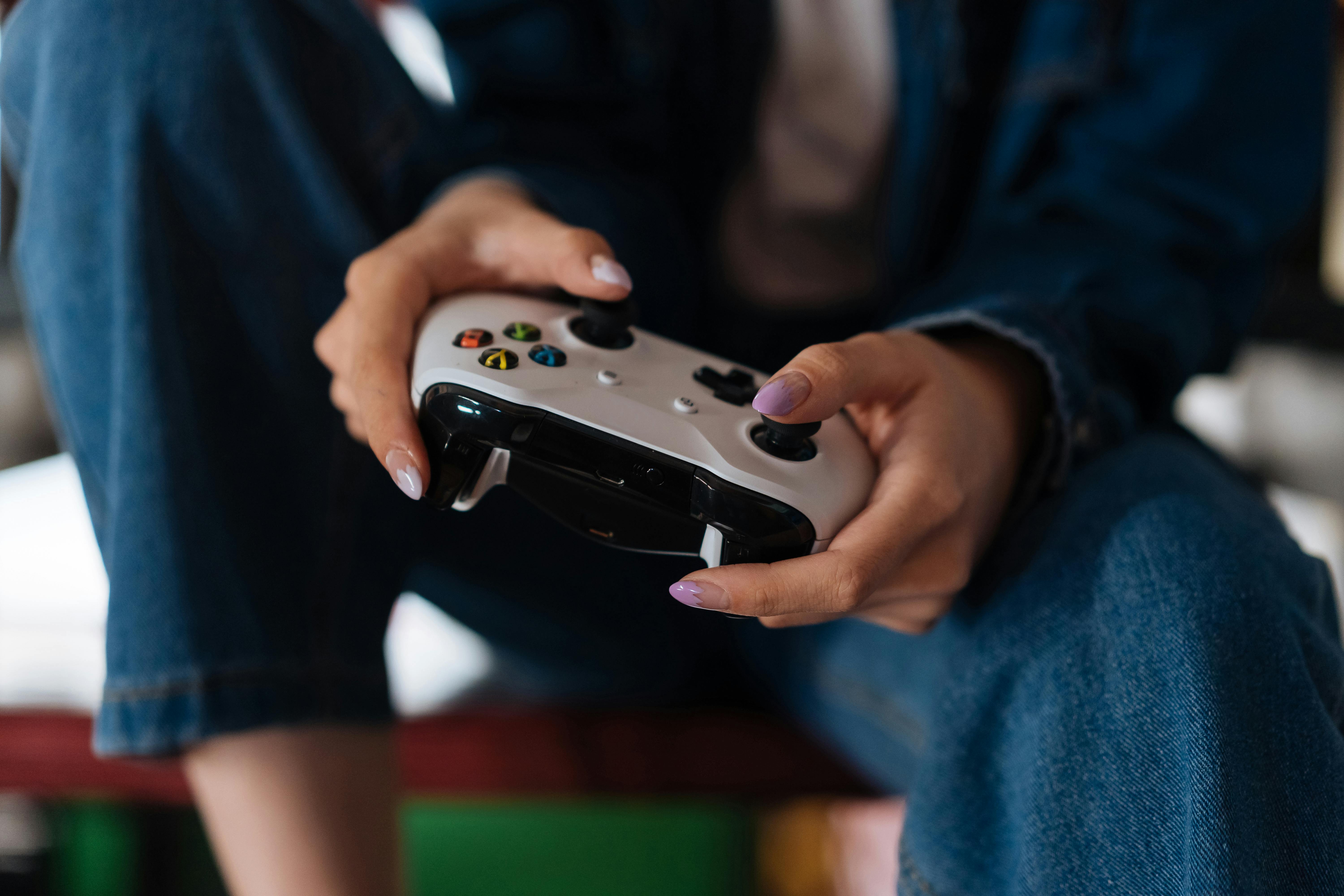 Person Holding a Game Controller · Free Stock Photo