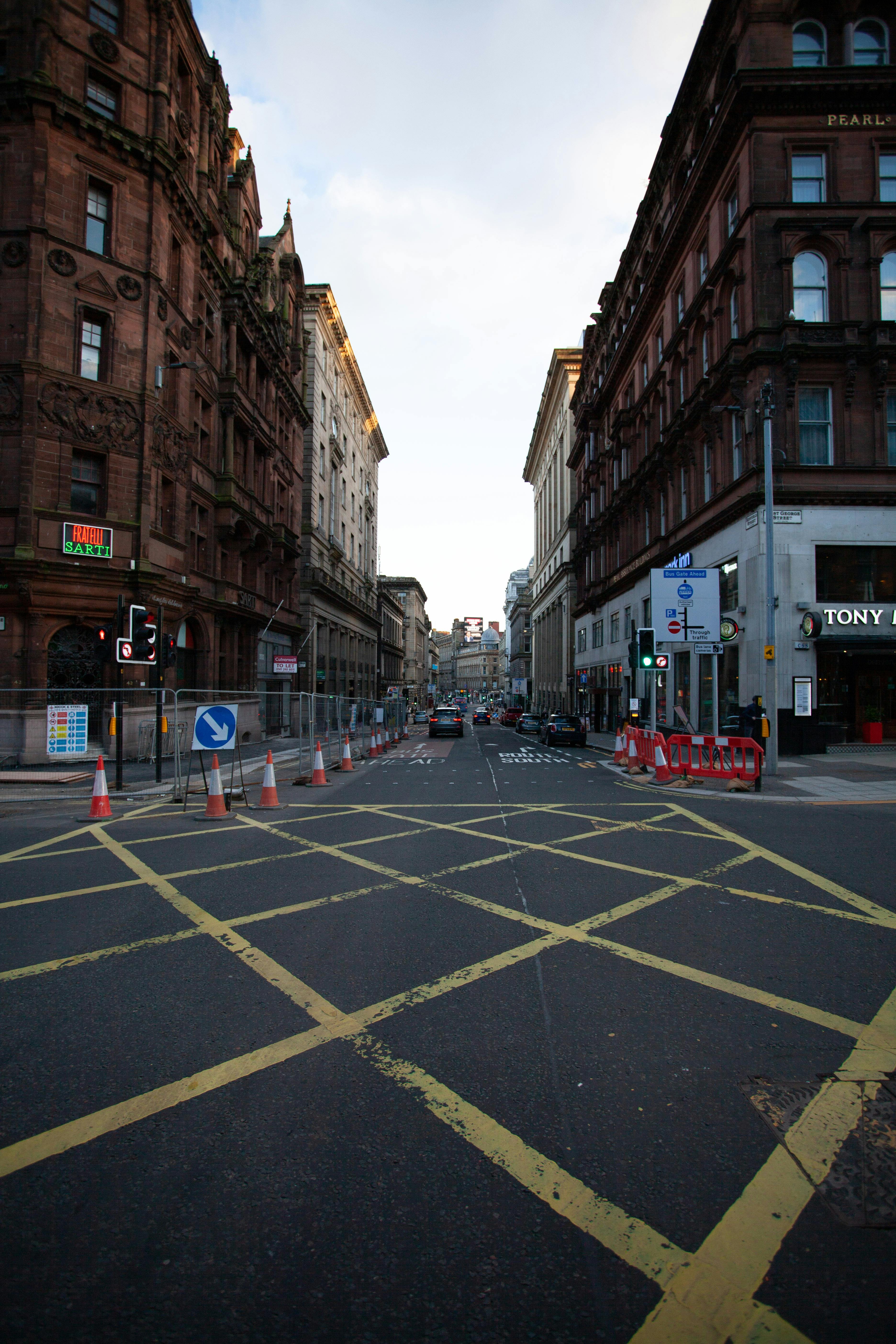 Road Between Buildings · Free Stock Photo
