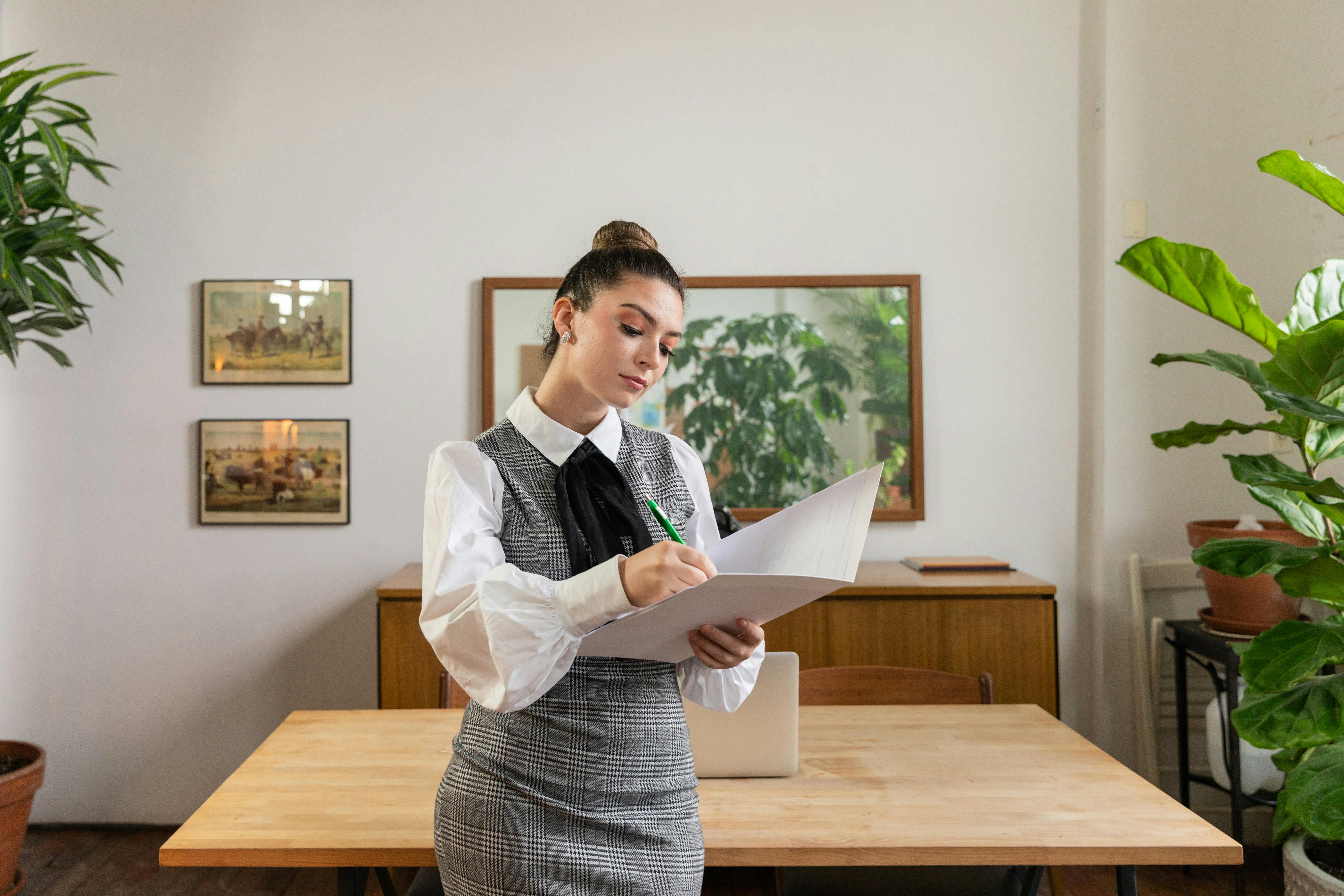 A Woman Working Inside an Office · Free Stock Photo