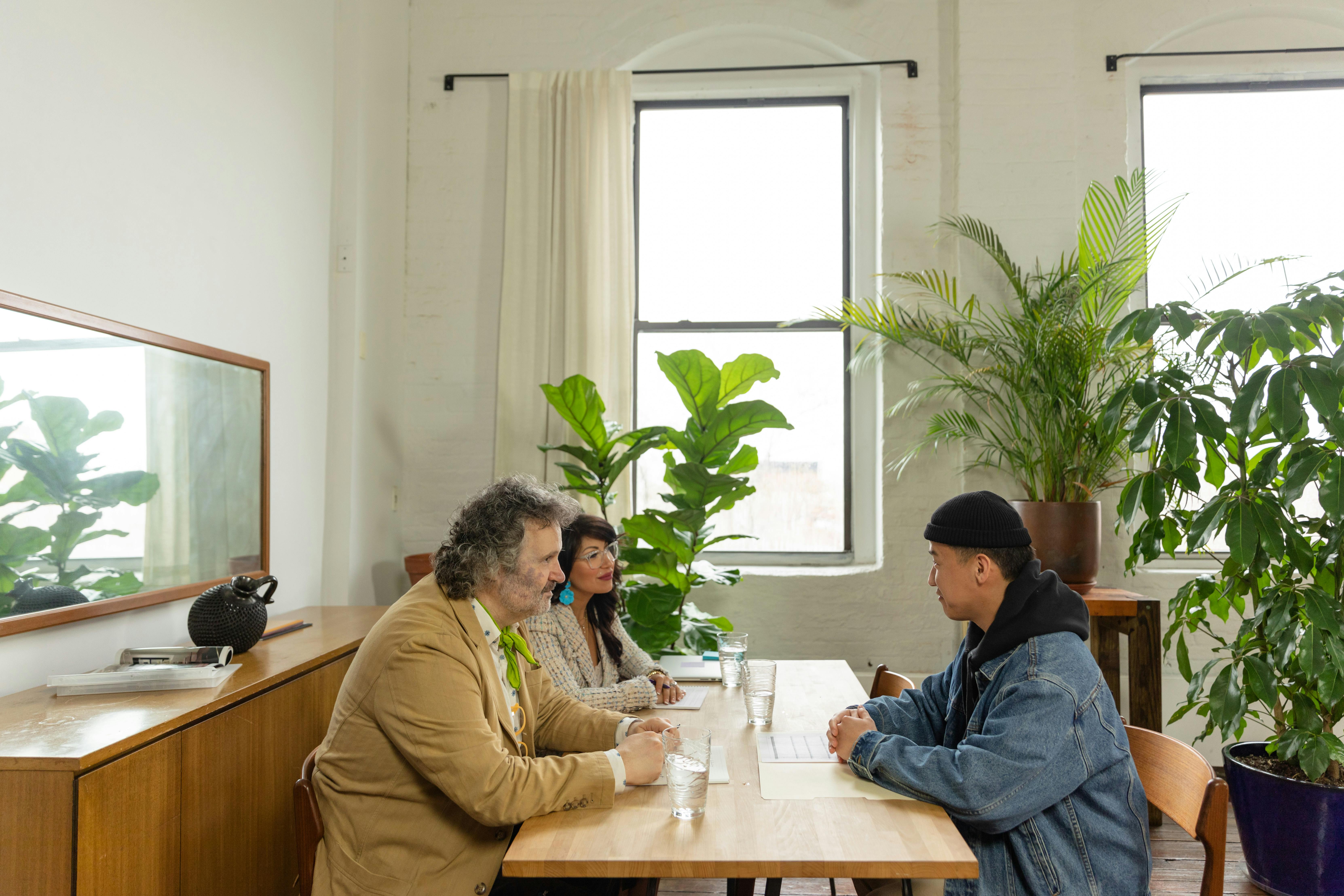 People Sitting at the Table · Free Stock Photo