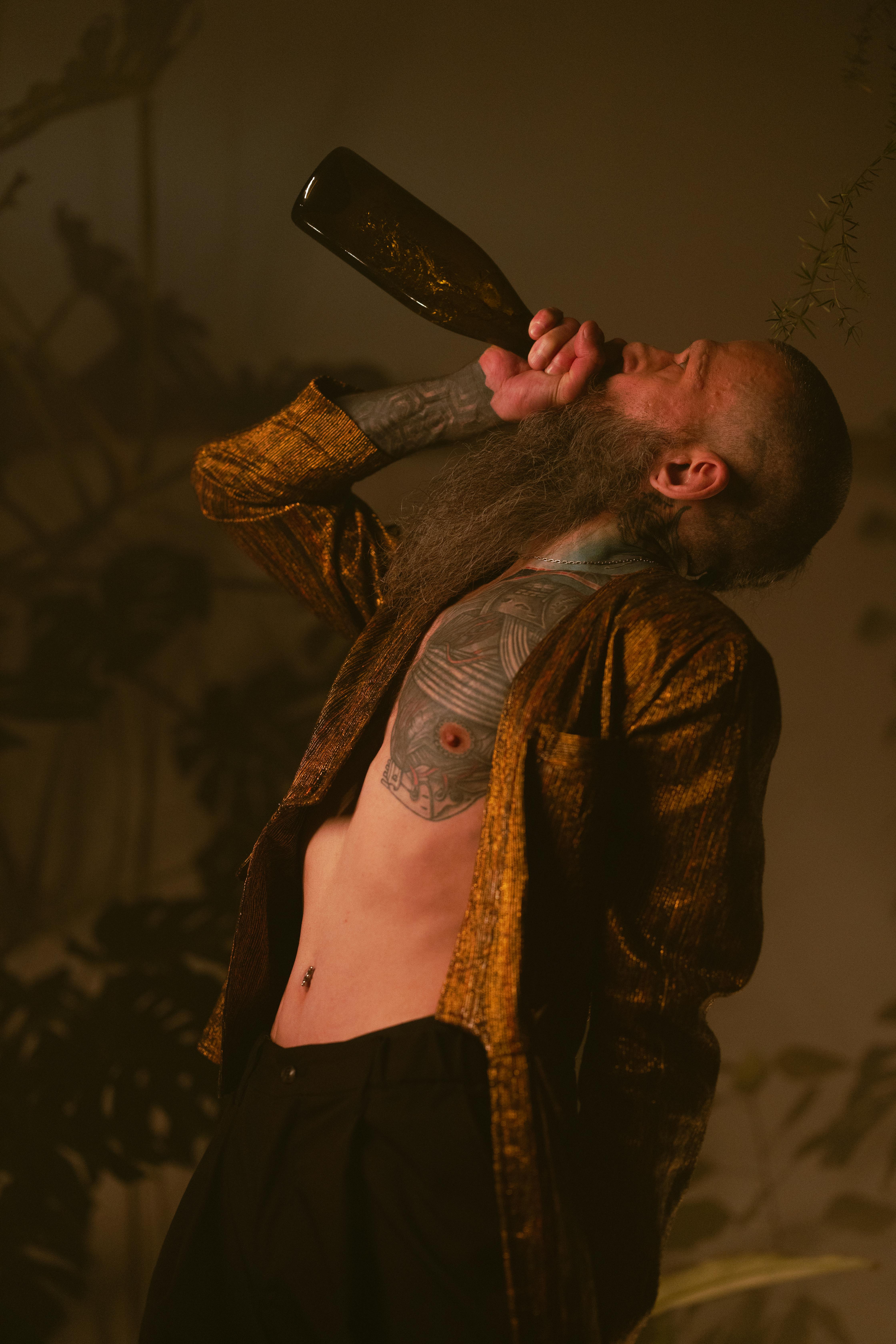 Photo of Man Gulping Beer · Free Stock Photo