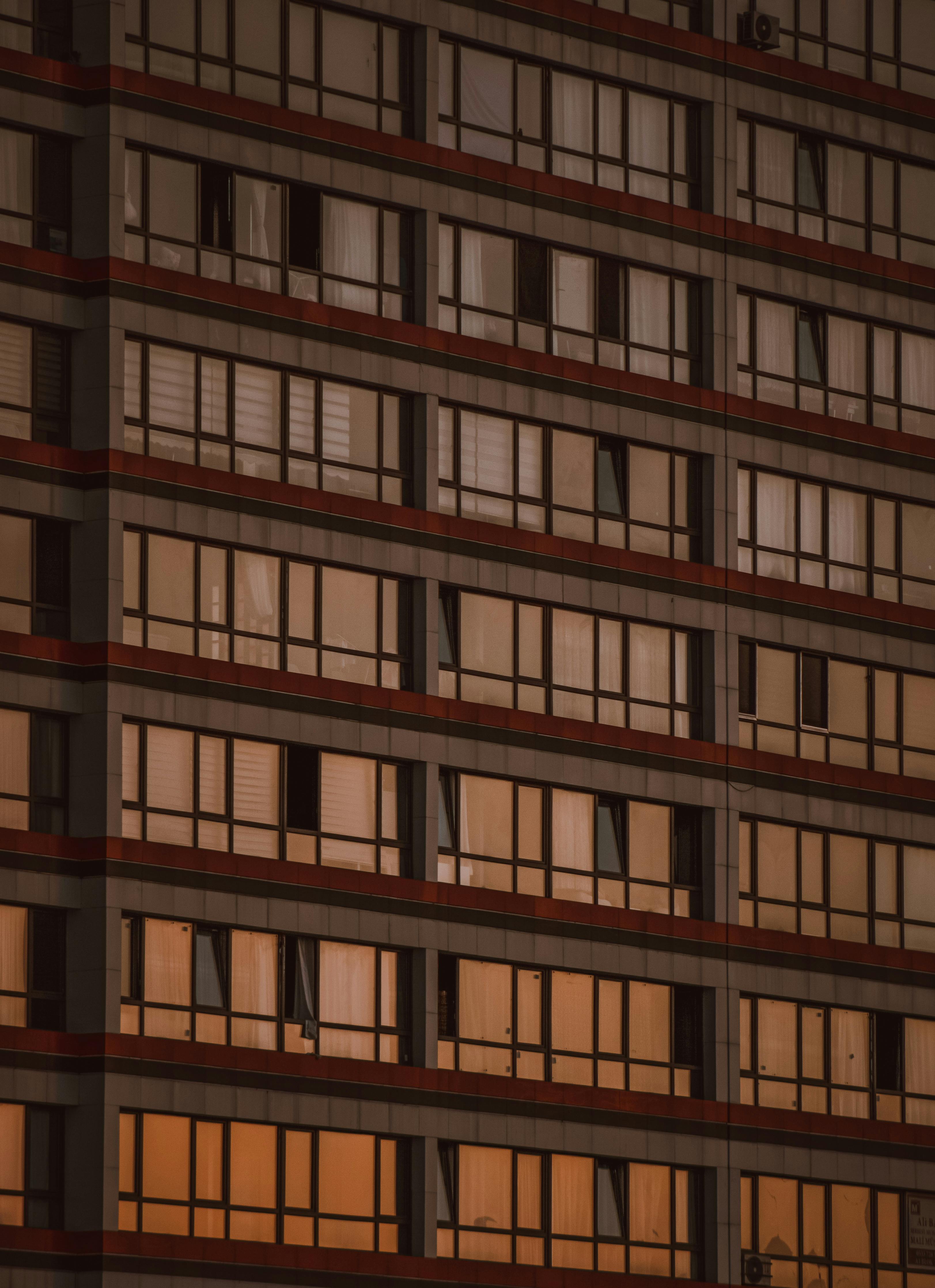 Glass Panel Windows of a Contemporary Building · Free Stock Photo