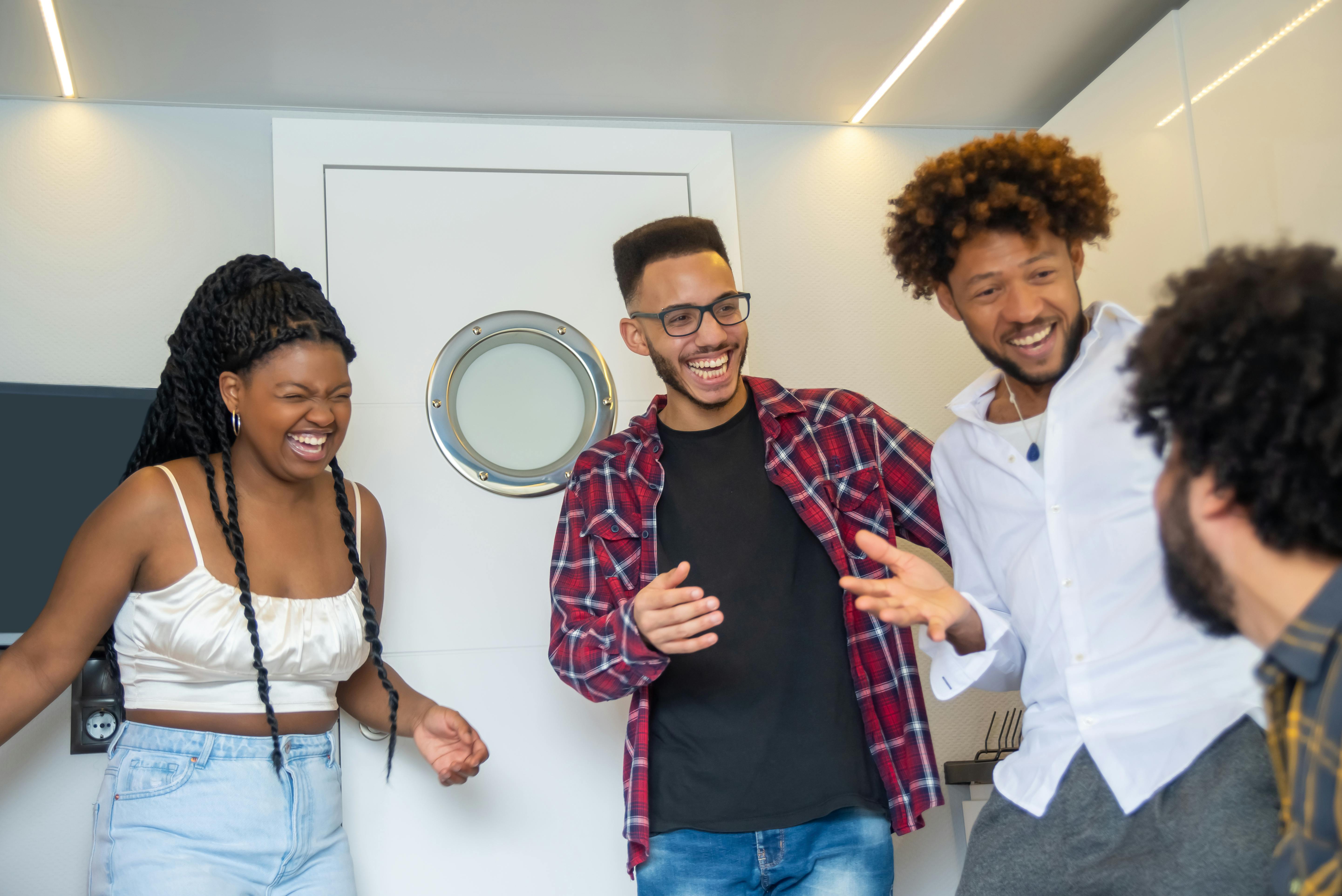 Men and a Woman Aboard a Ship · Free Stock Photo