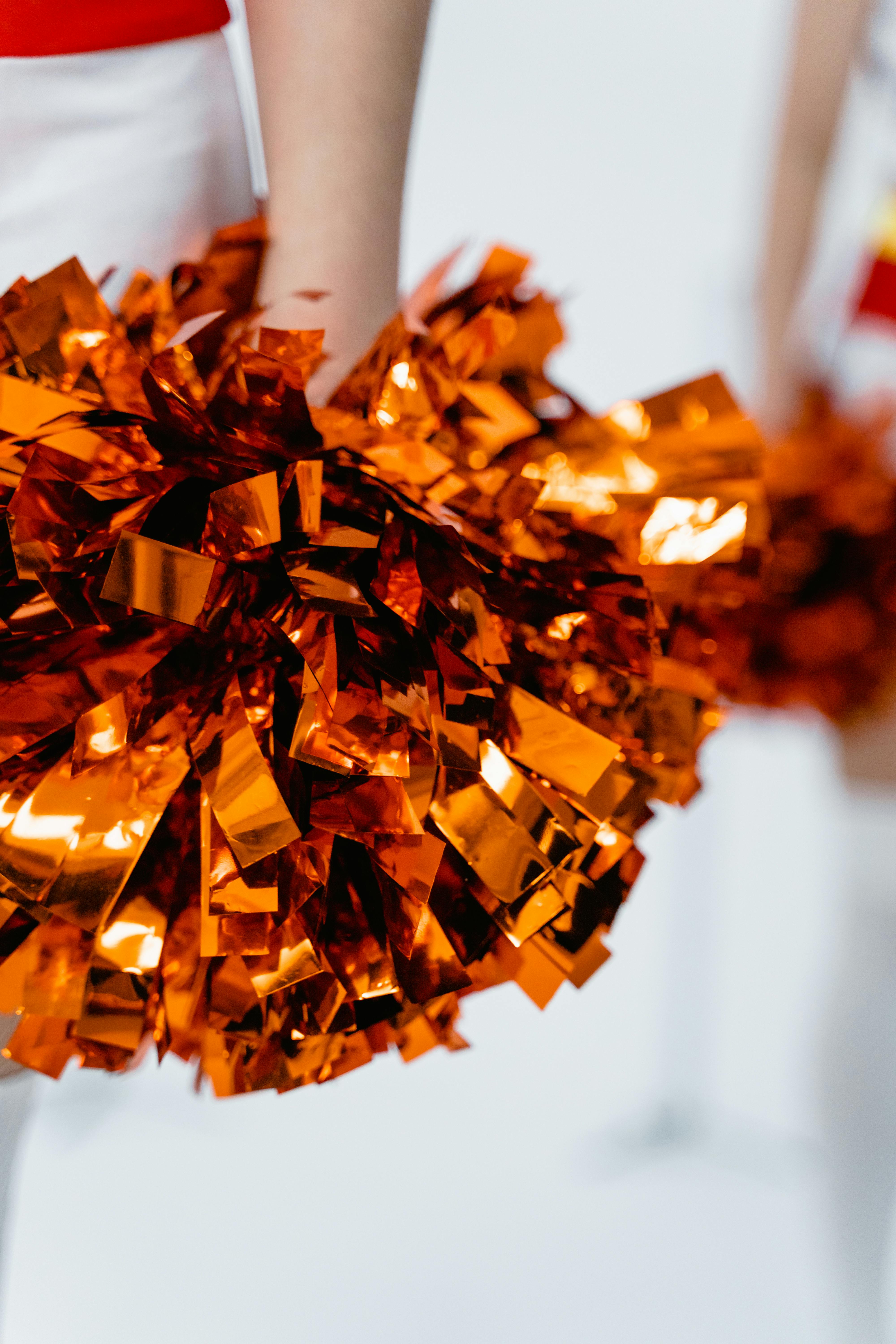Person Holding a Pompom · Free Stock Photo