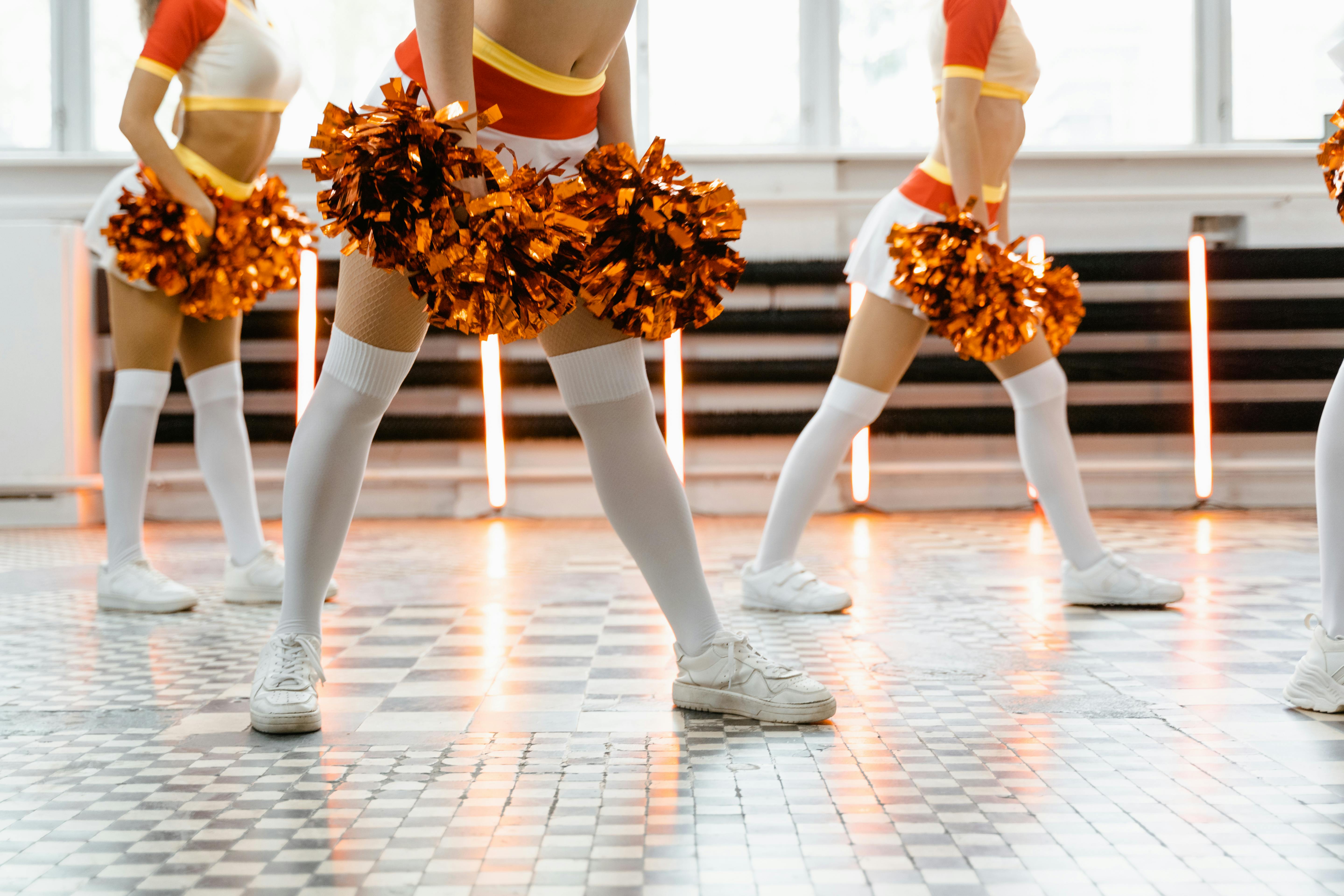 Legs of Dancing Cheerleaders · Free Stock Photo