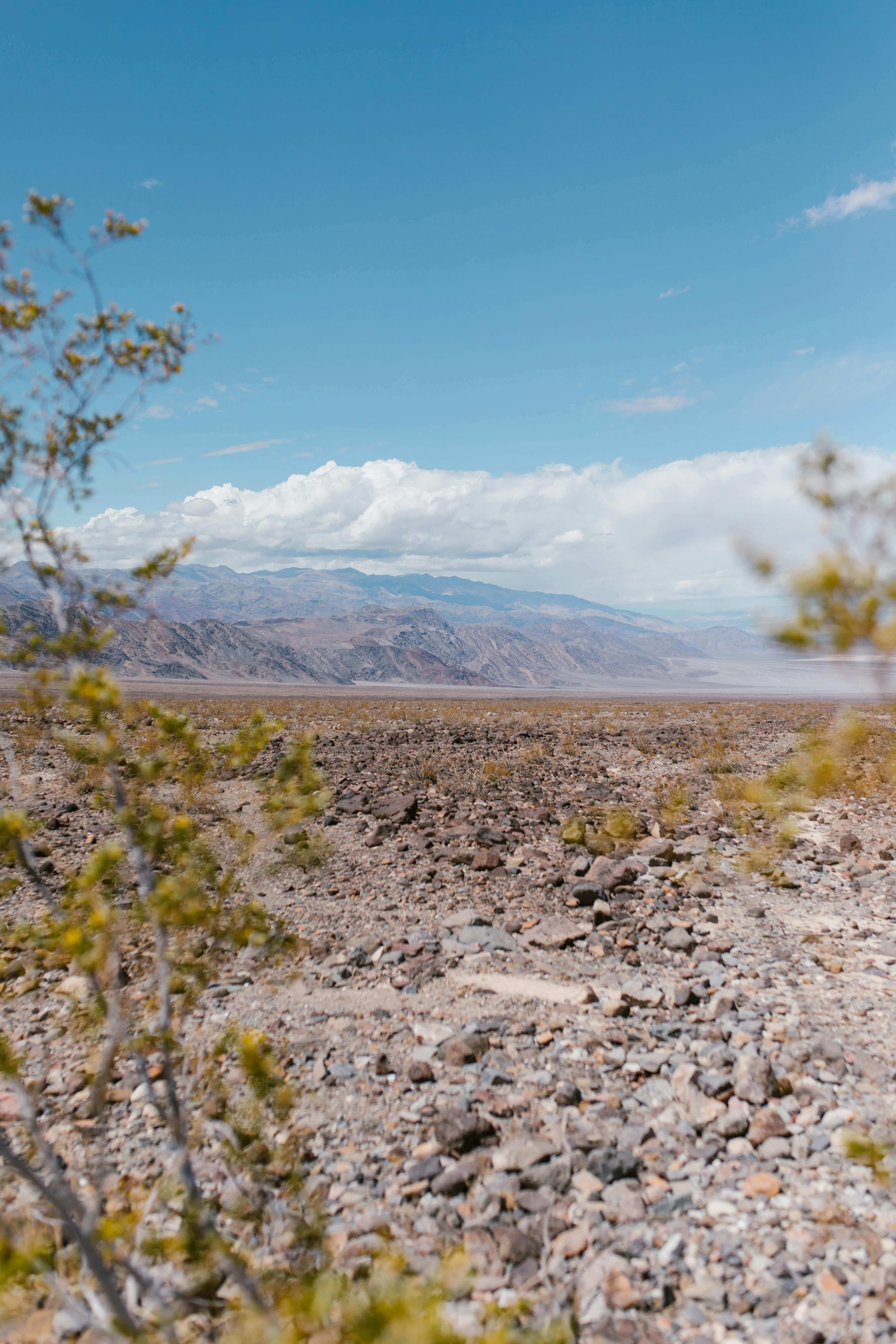 A Rocky Field under a Cloudy Sky · Free Stock Photo