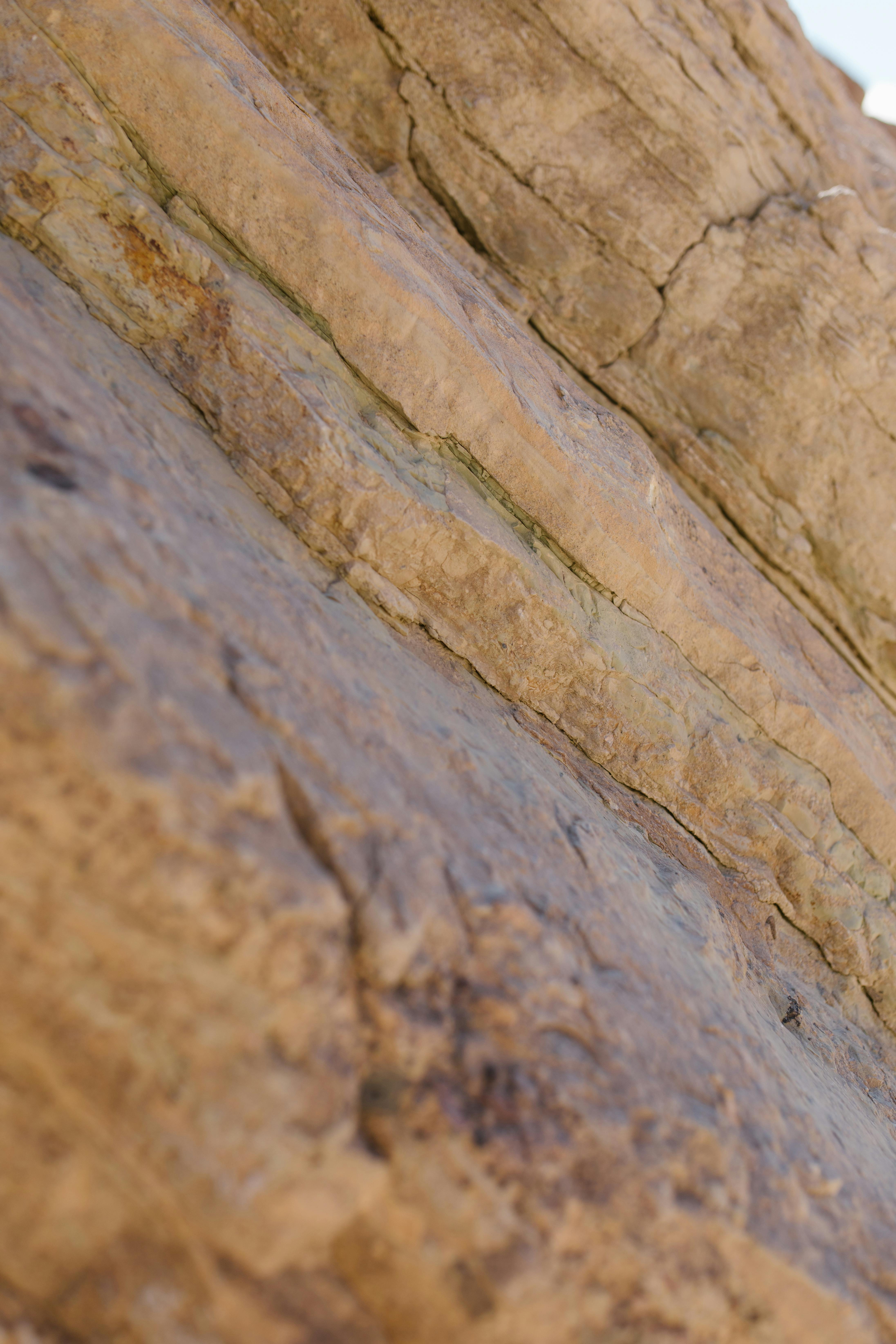 Close Up Shot Of Brown Rock Formation · Free Stock Photo