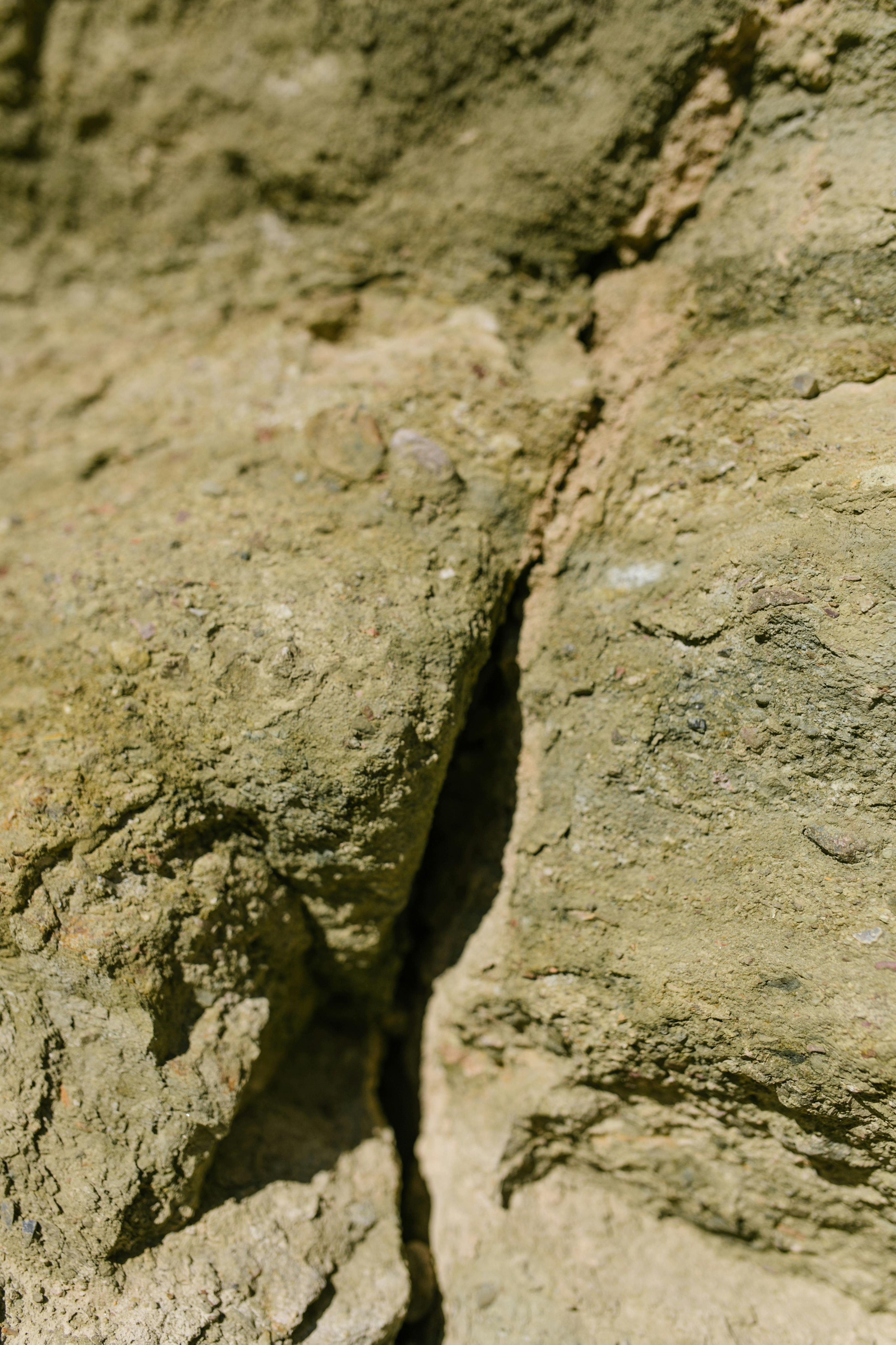 Close Up Shot Of Brown Rock Formation · Free Stock Photo