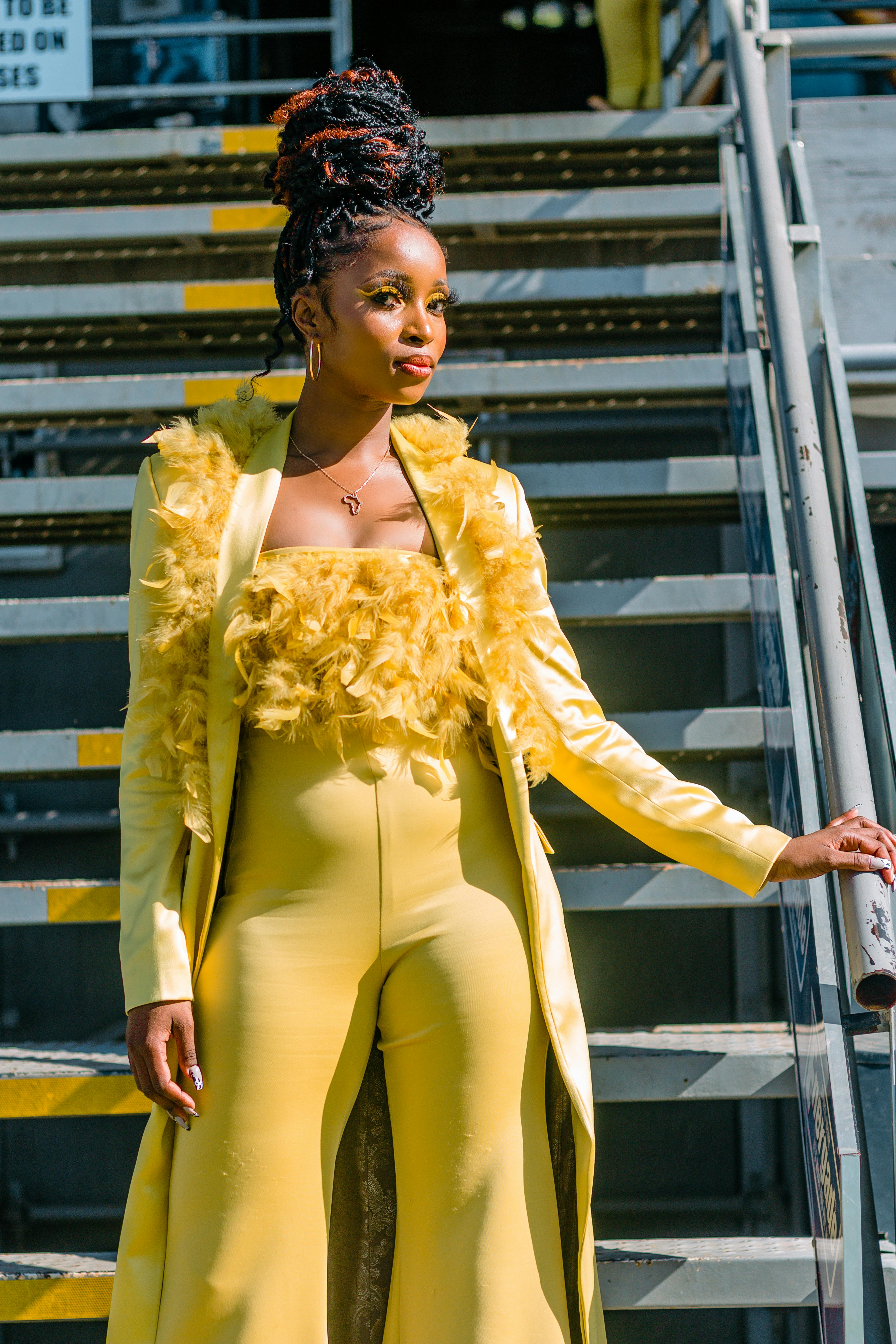 Person Wearing Brown Checkered Formal Outfit · Free Stock Photo