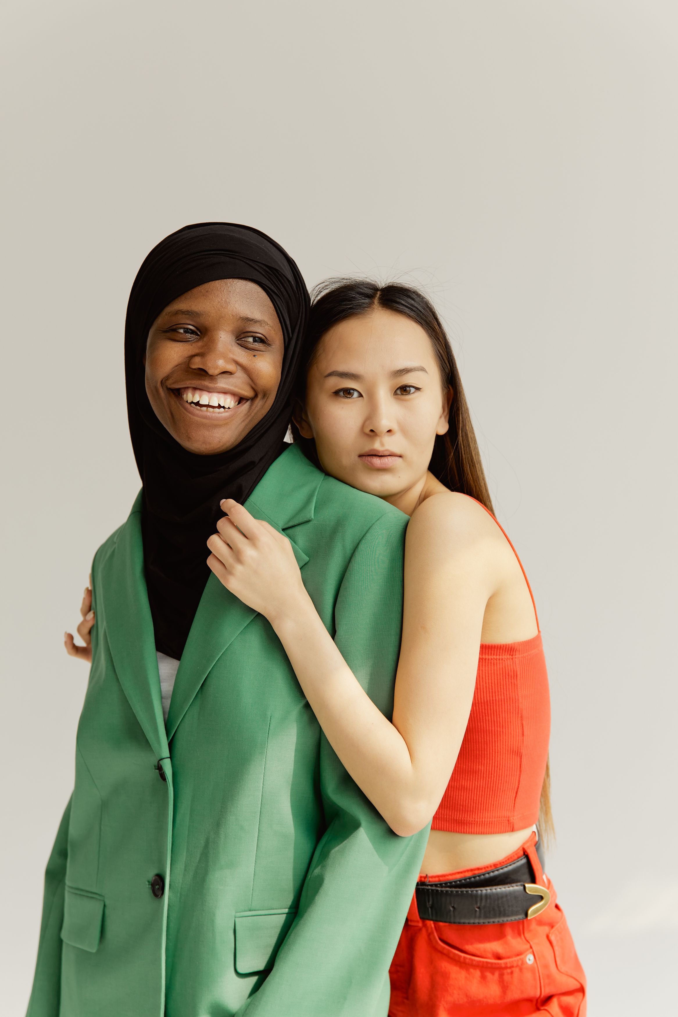 Two Women Standing and Hugging · Free Stock Photo