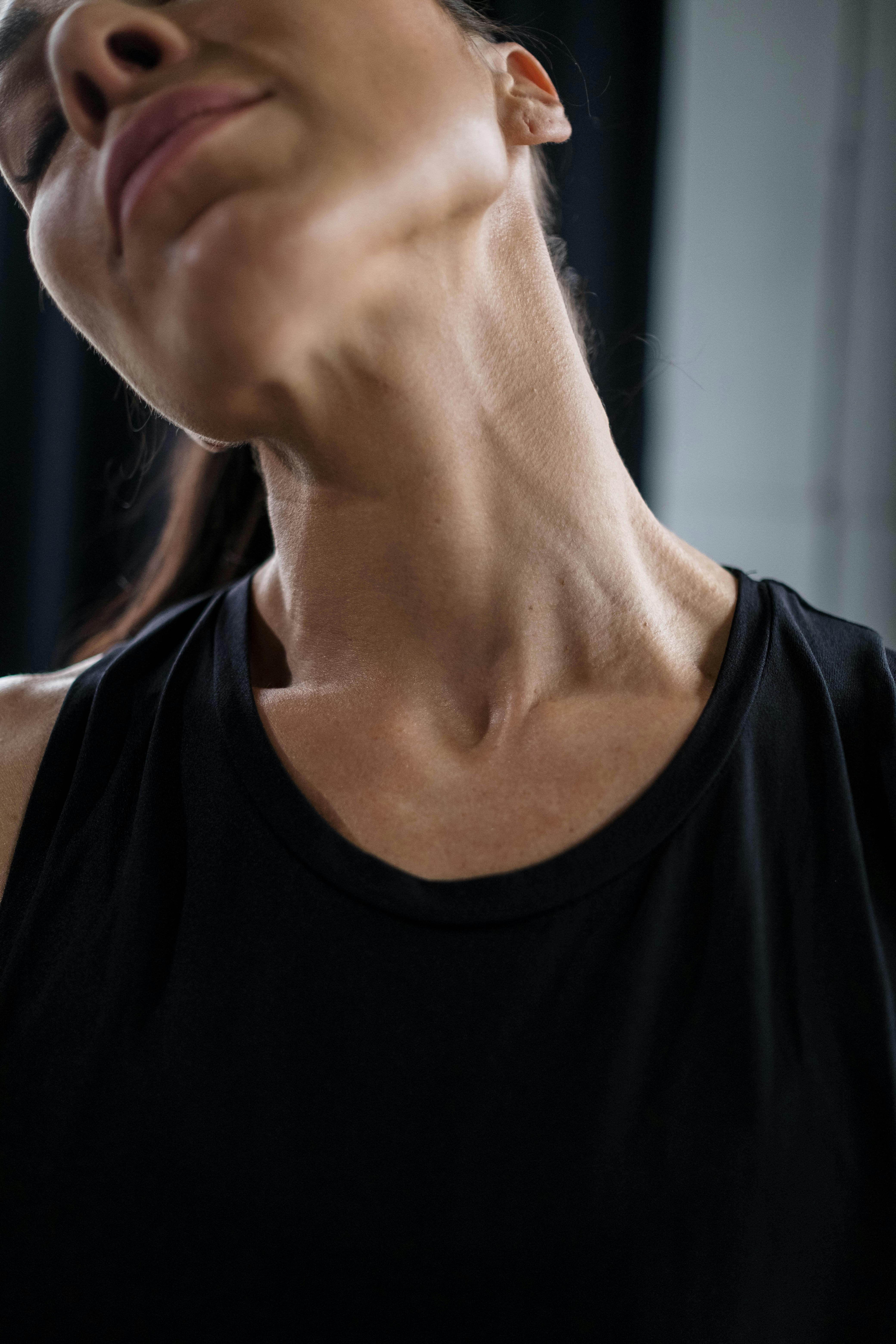 Stretching Neck Photos, Download The BEST Free Stretching Neck Stock ...