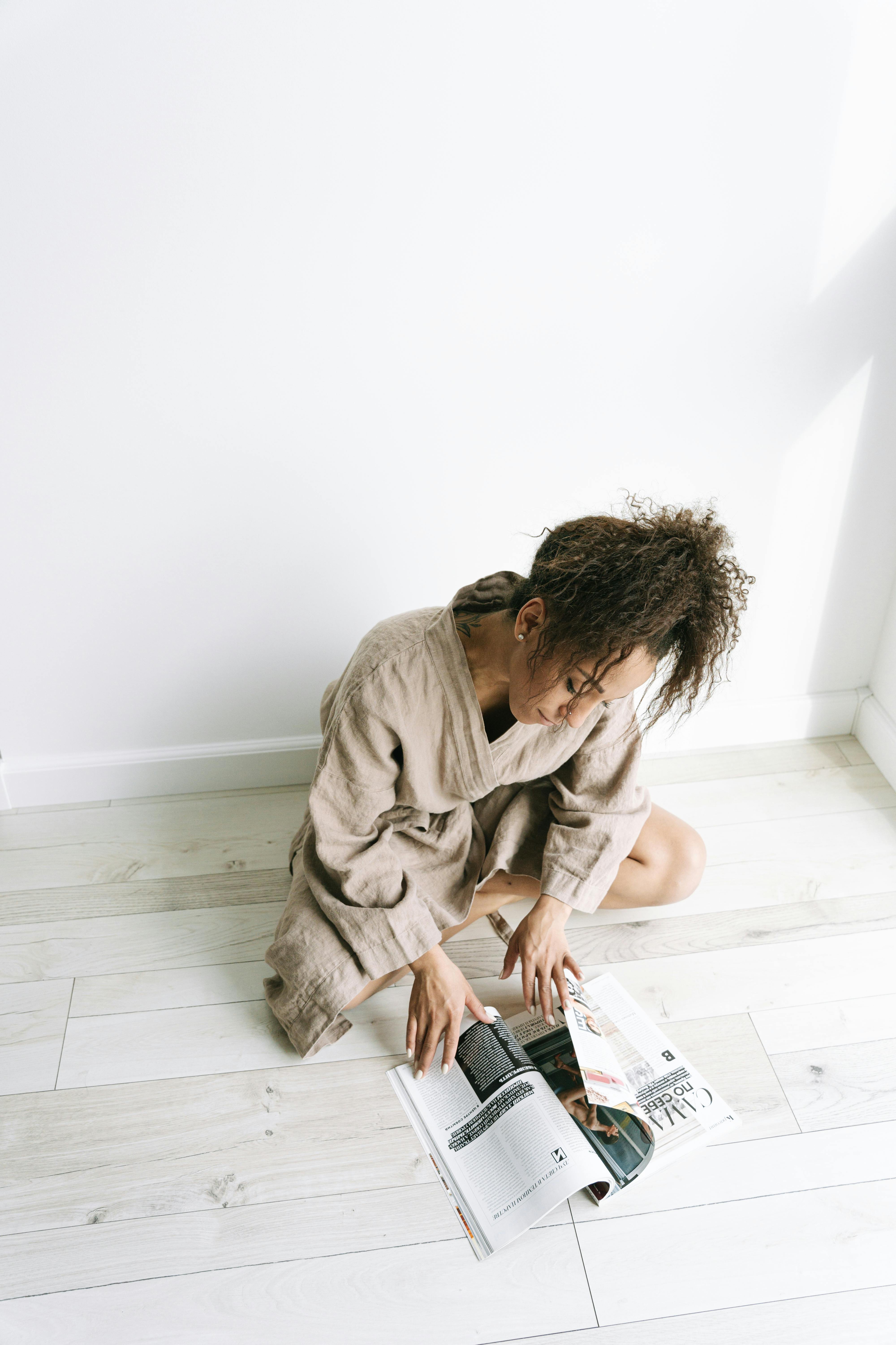 Woman Reading a Magazine · Free Stock Photo