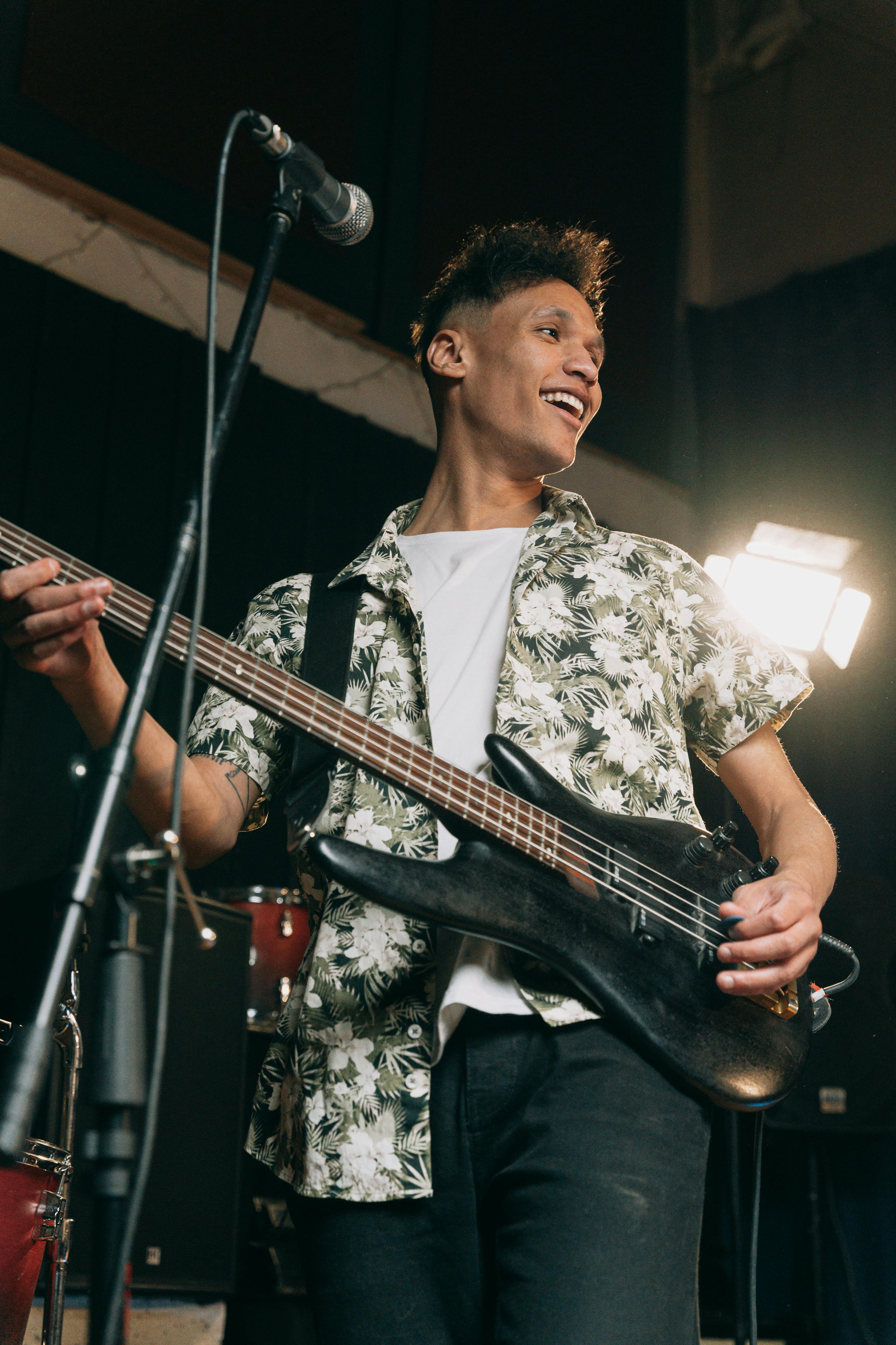 A Bassist Performing Onstage · Free Stock Photo