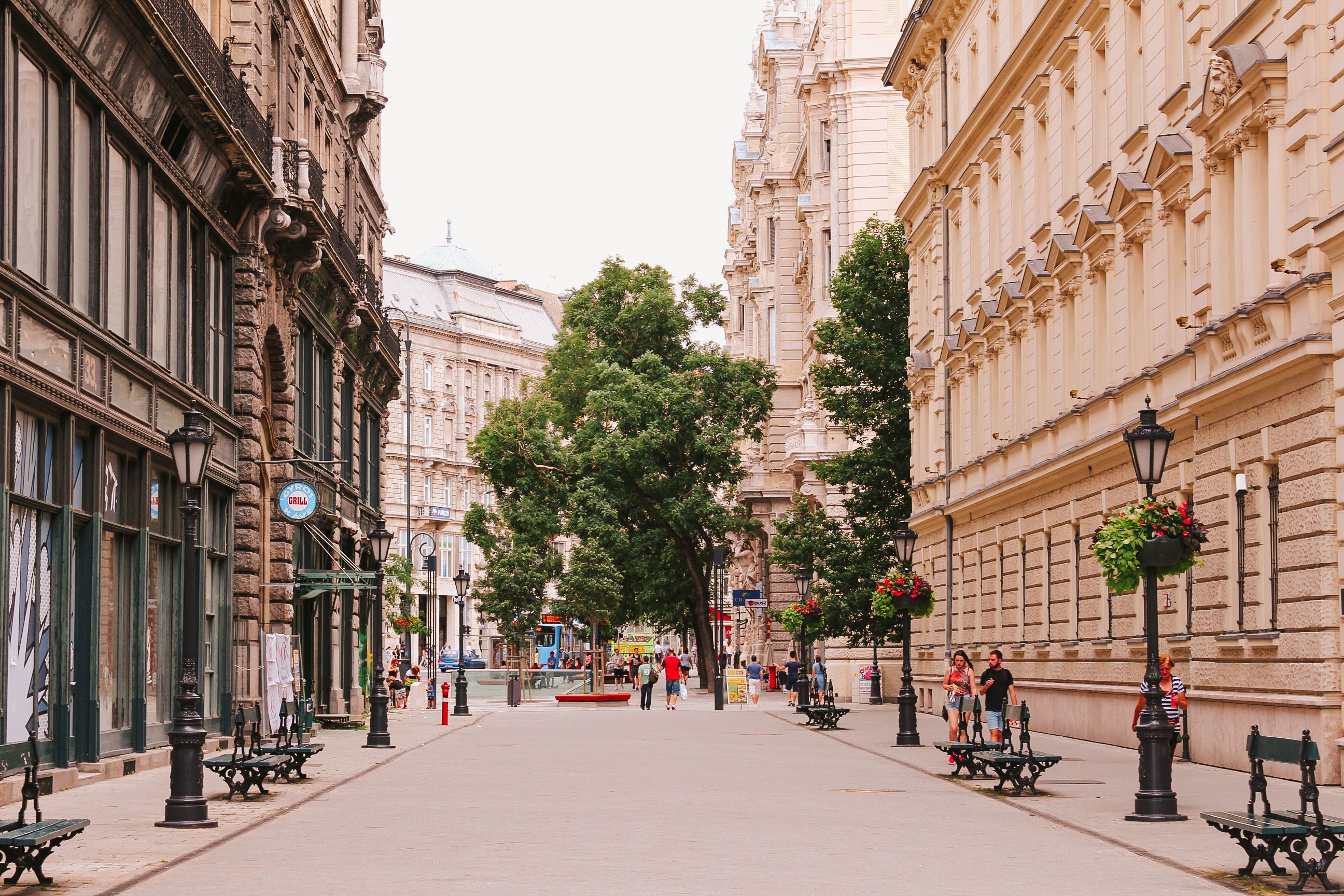 People on City Street Between Buildings · Free Stock Photo