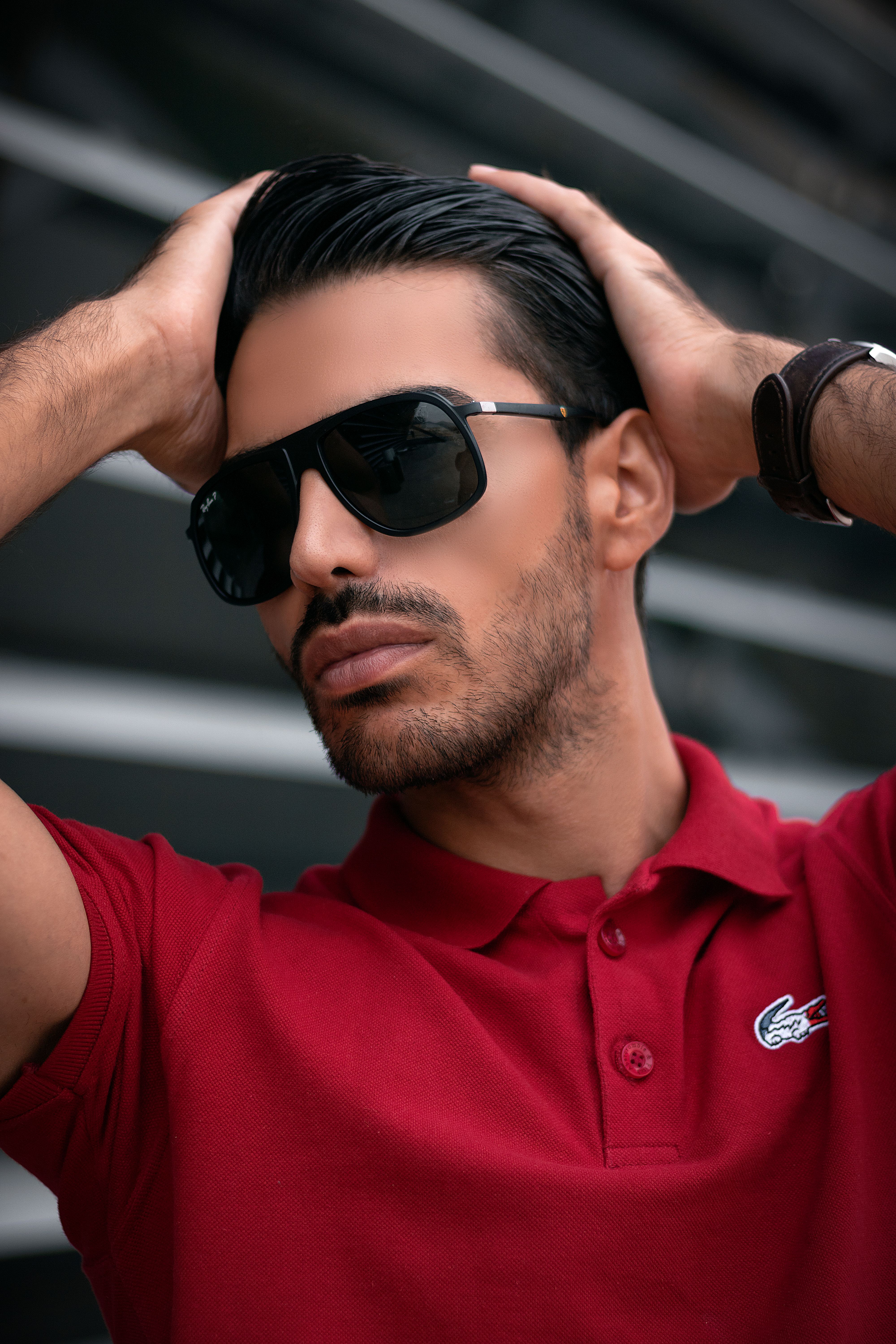 Man Wearing Red Polo Shirt Touching his Hair · Free Stock Photo