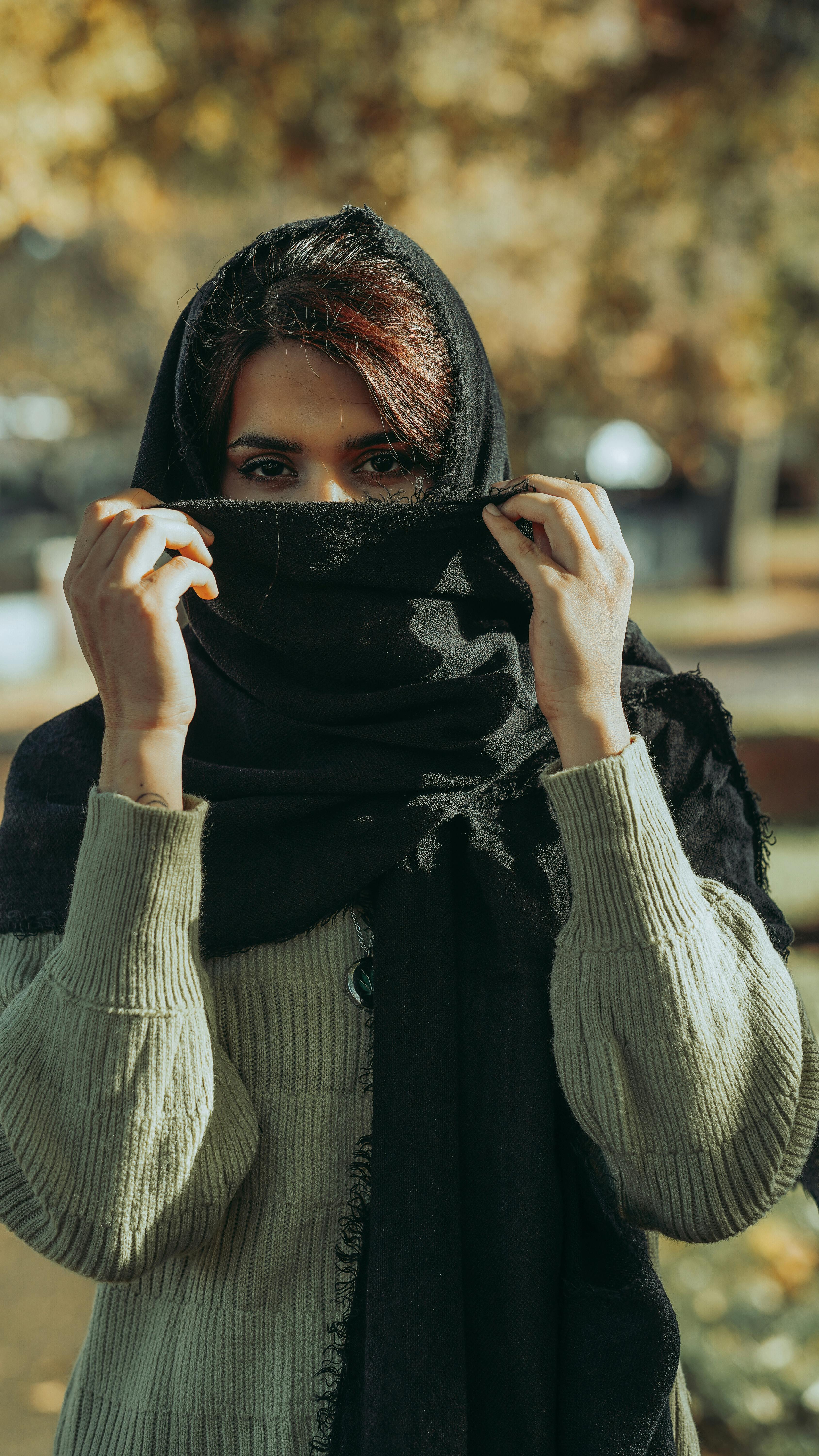 Woman Covering Face with Scarf · Free Stock Photo