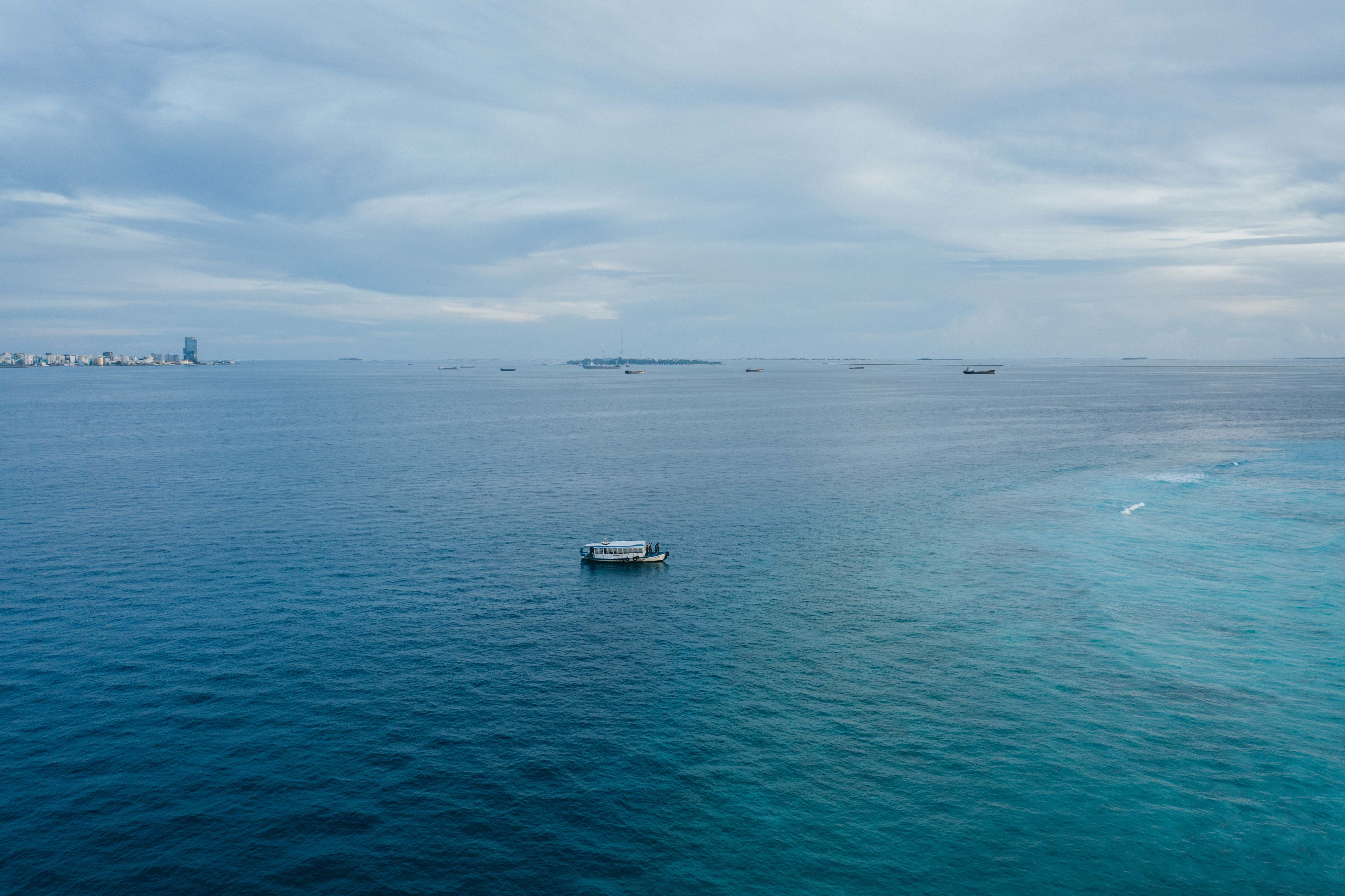 Ship floating on rippling sea · Free Stock Photo
