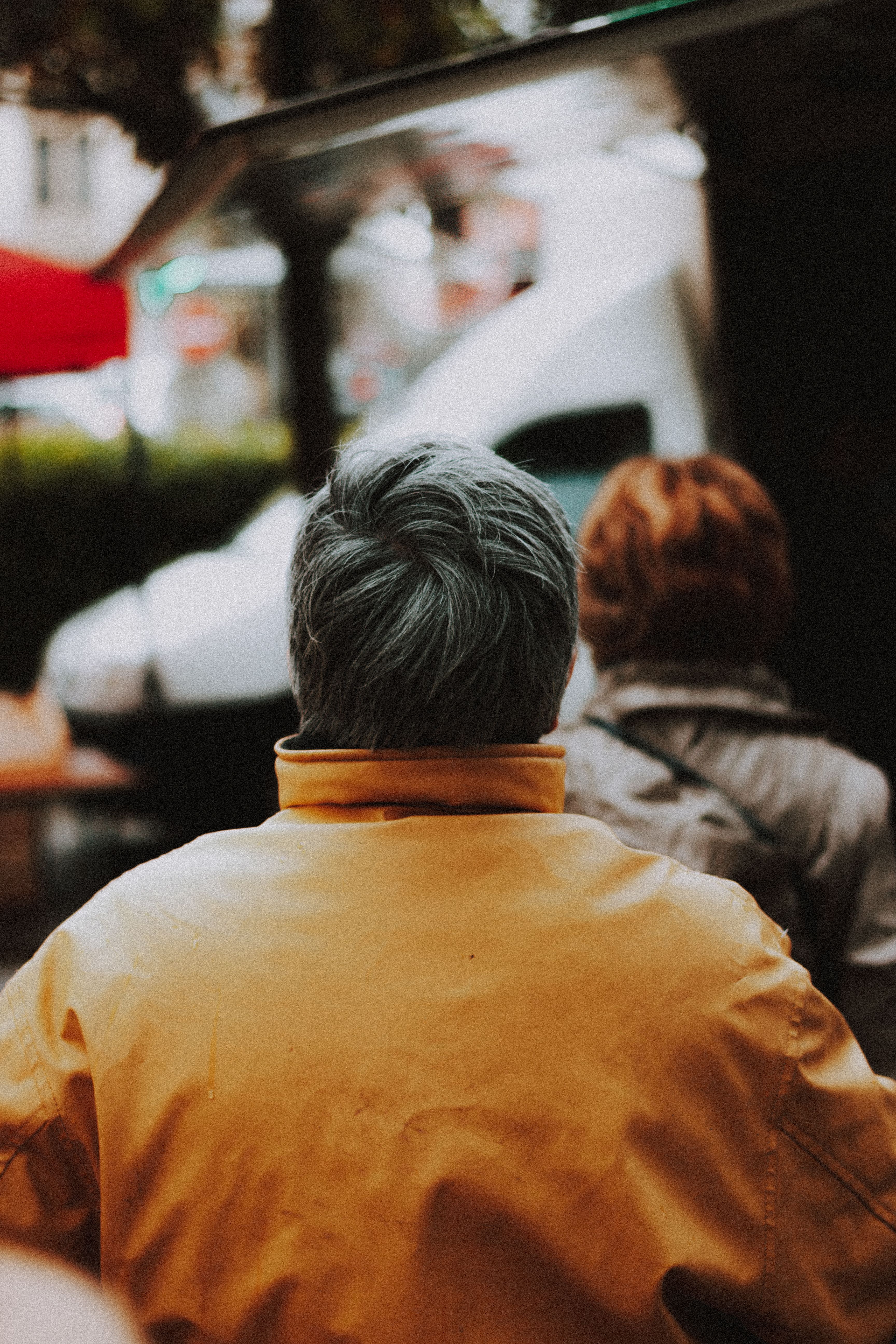 Back View of a Man wearing Yellow Jacket · Free Stock Photo