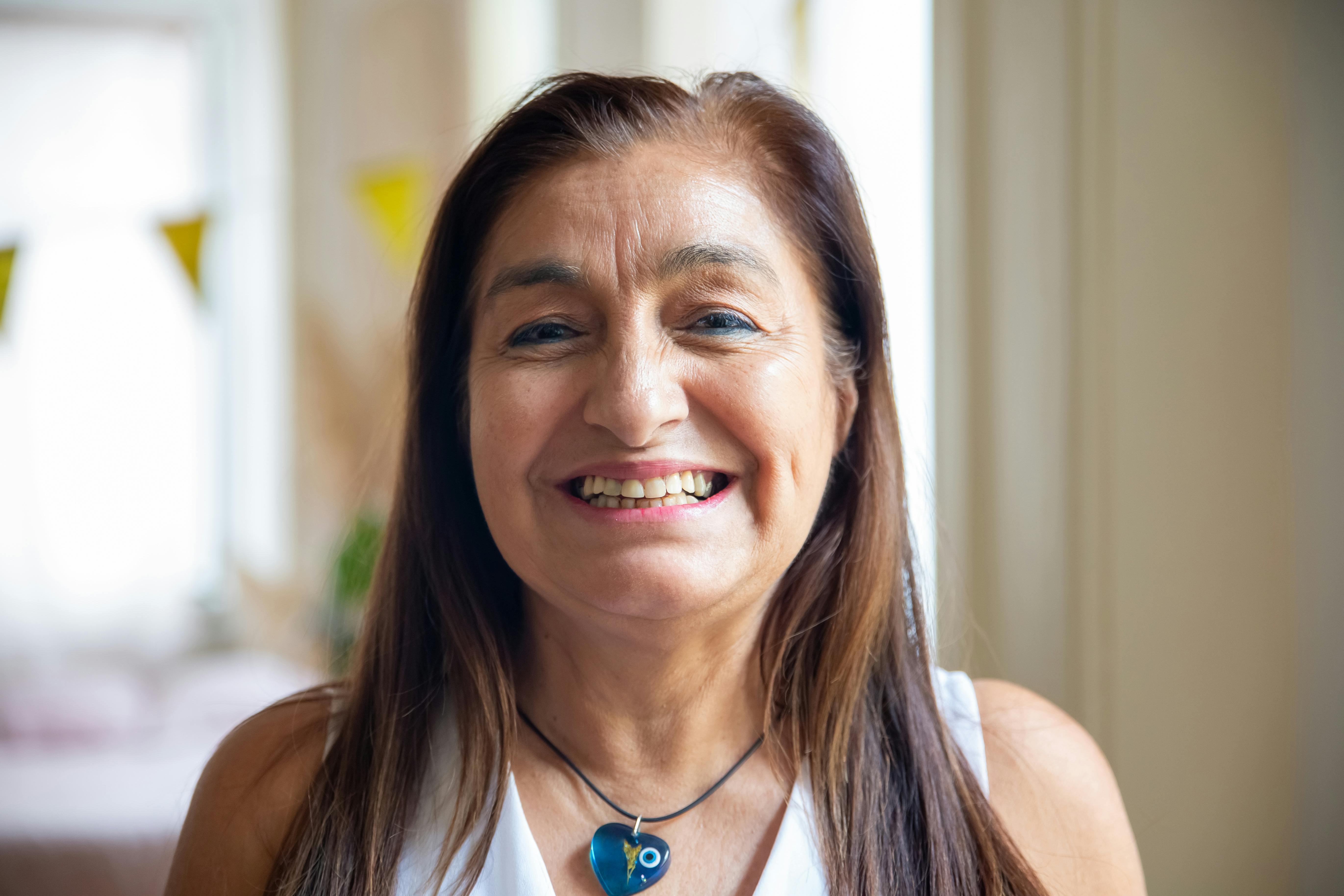 Women Smiling at the Camera · Free Stock Photo