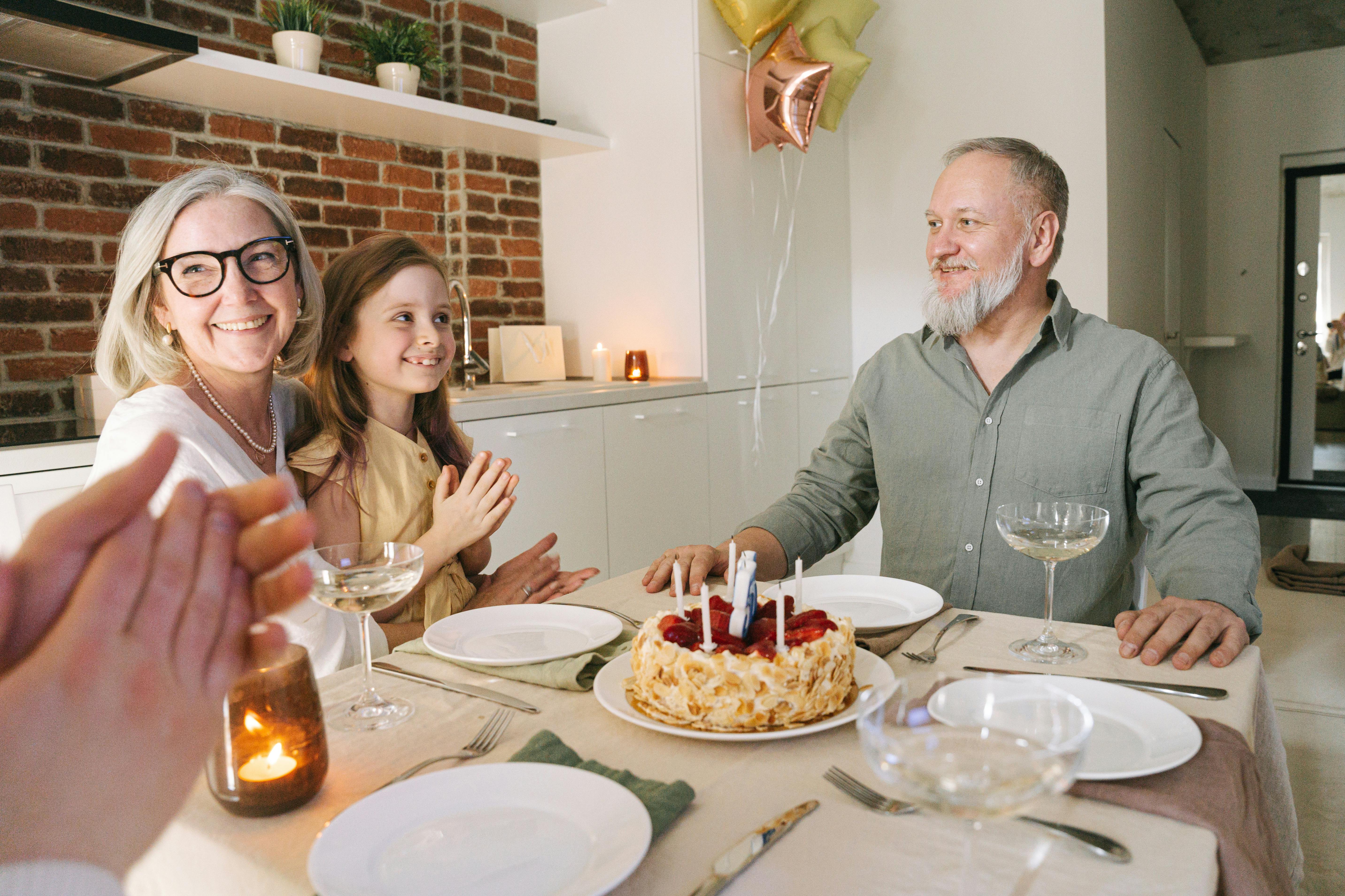 Man and Woman Sitting at the Table · Free Stock Photo