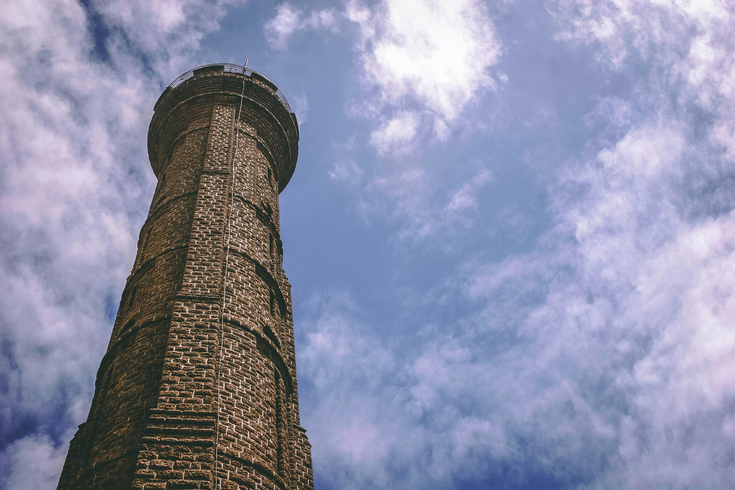 Brown Brick Watchtower · Free Stock Photo