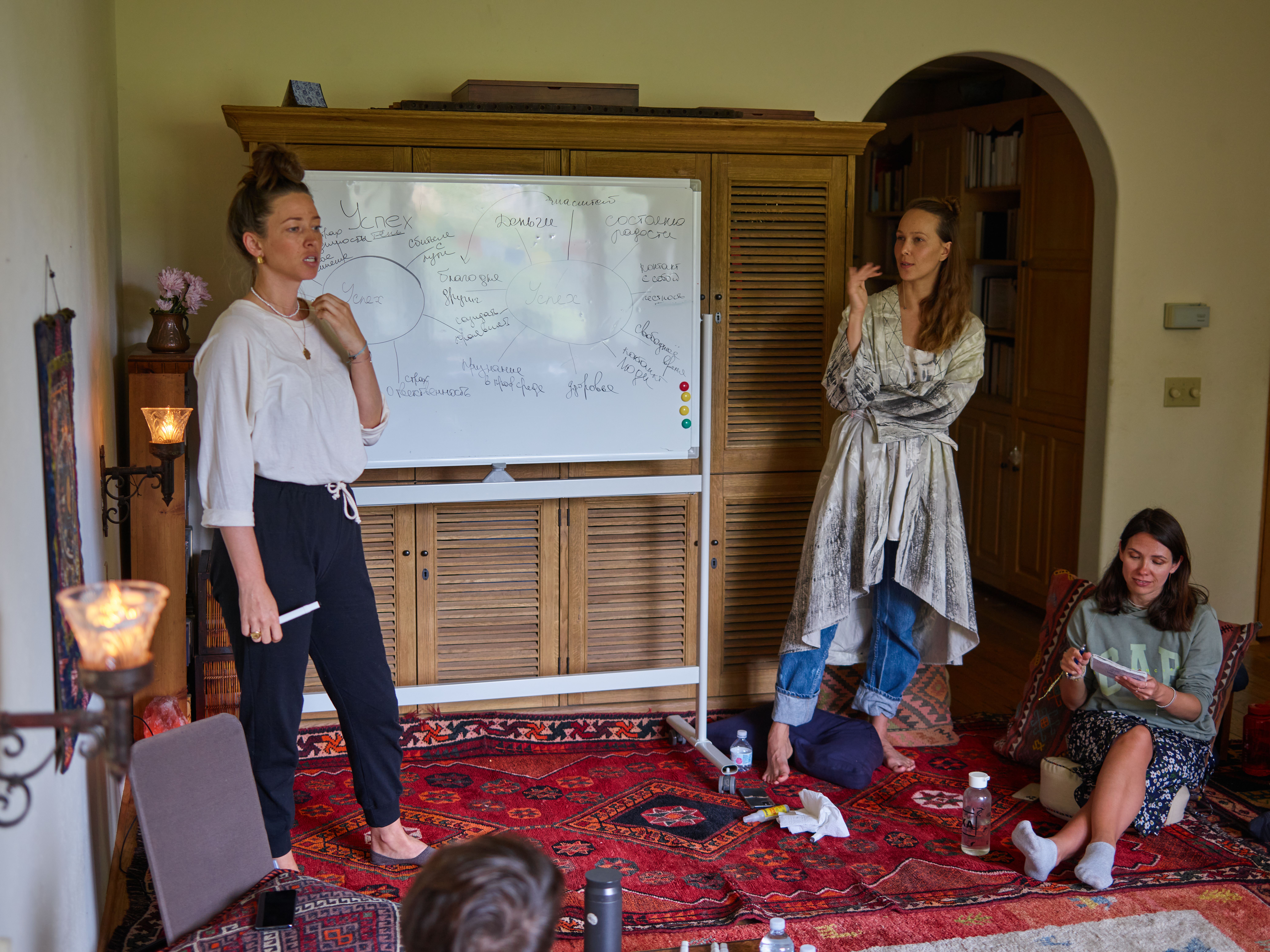 Women Teaching by a Whiteboard · Free Stock Photo