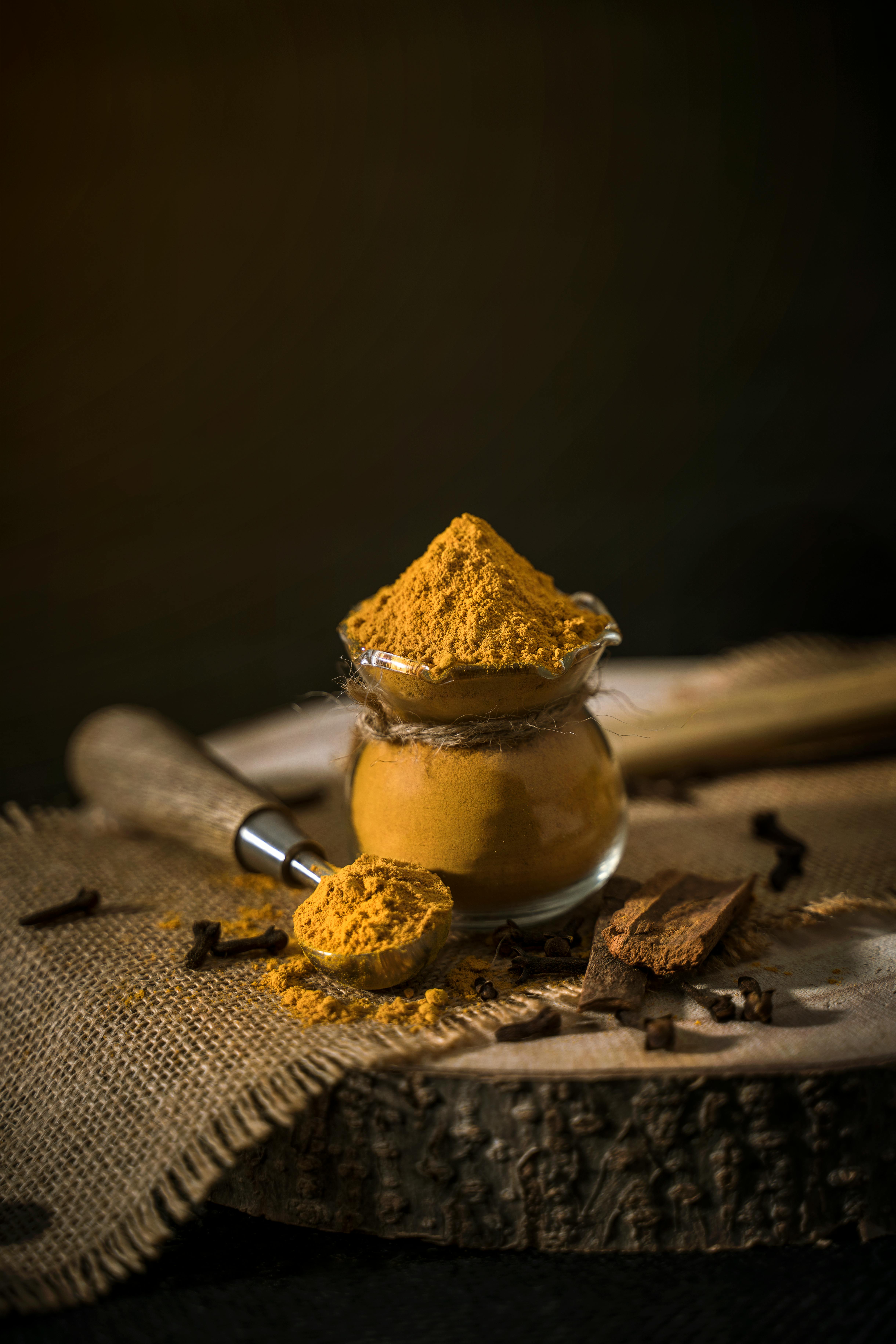 Yellow Powder in Glass Cup · Free Stock Photo