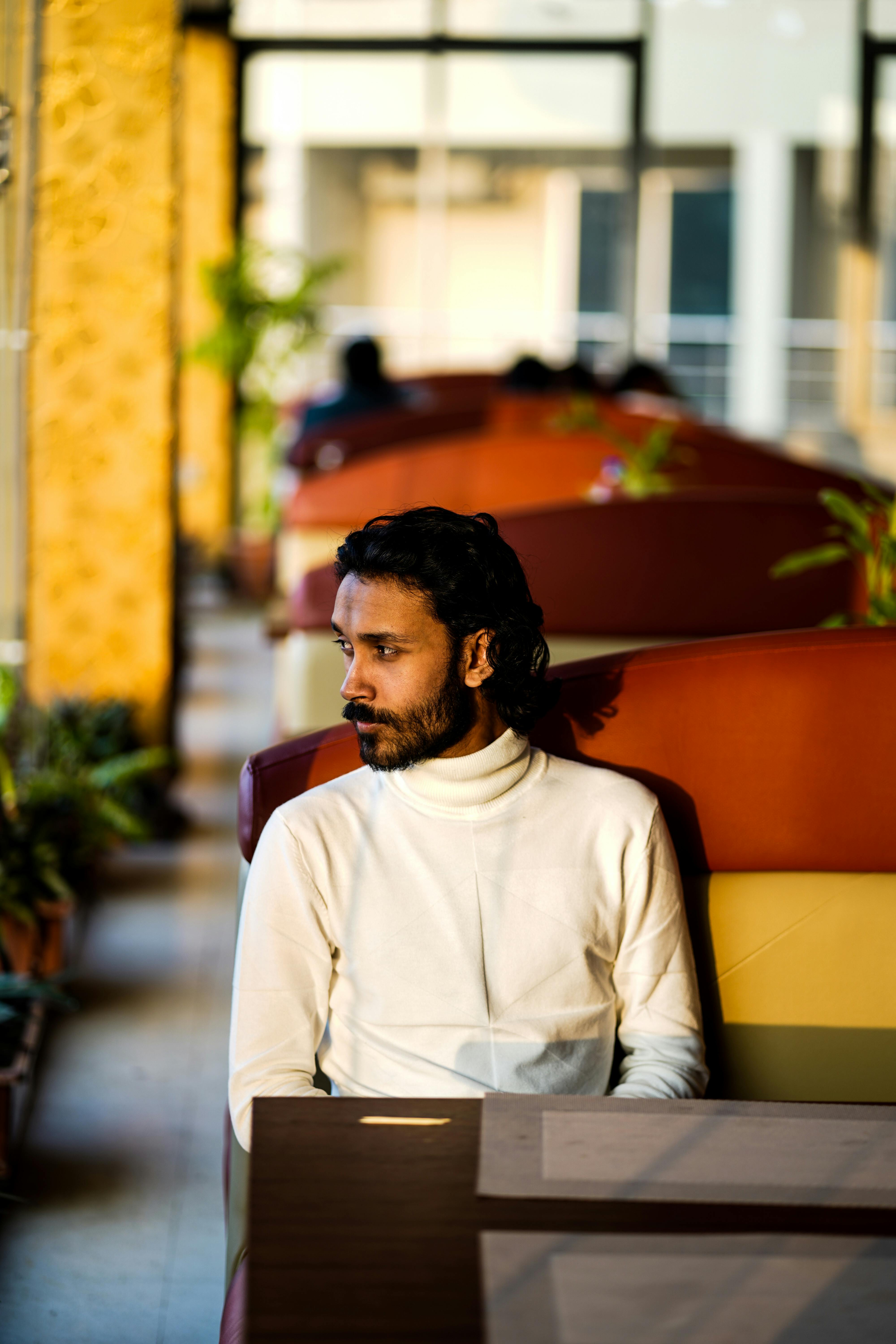 Side View of a Man While Reading · Free Stock Photo