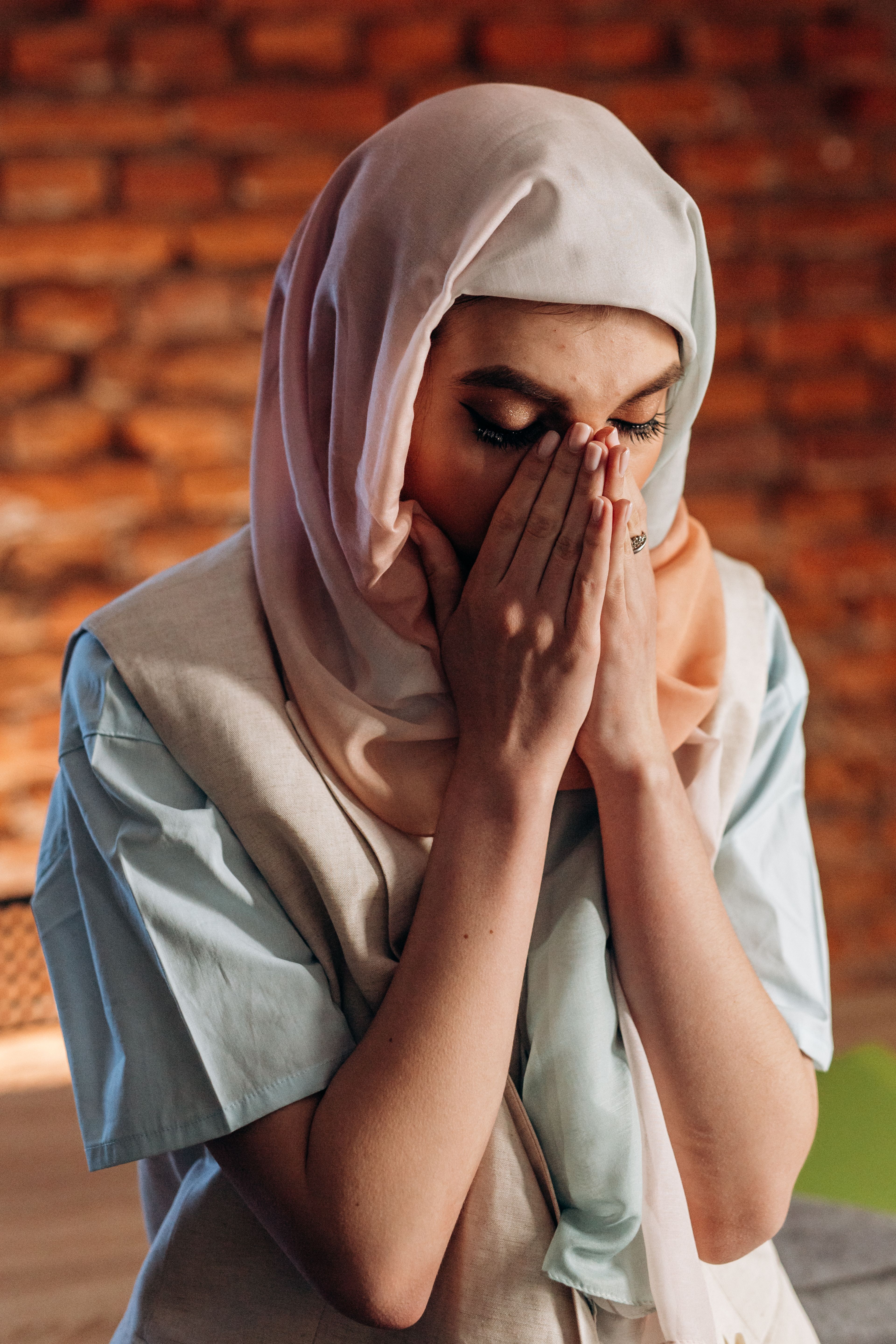 A Woman Covering Her Face · Free Stock Photo