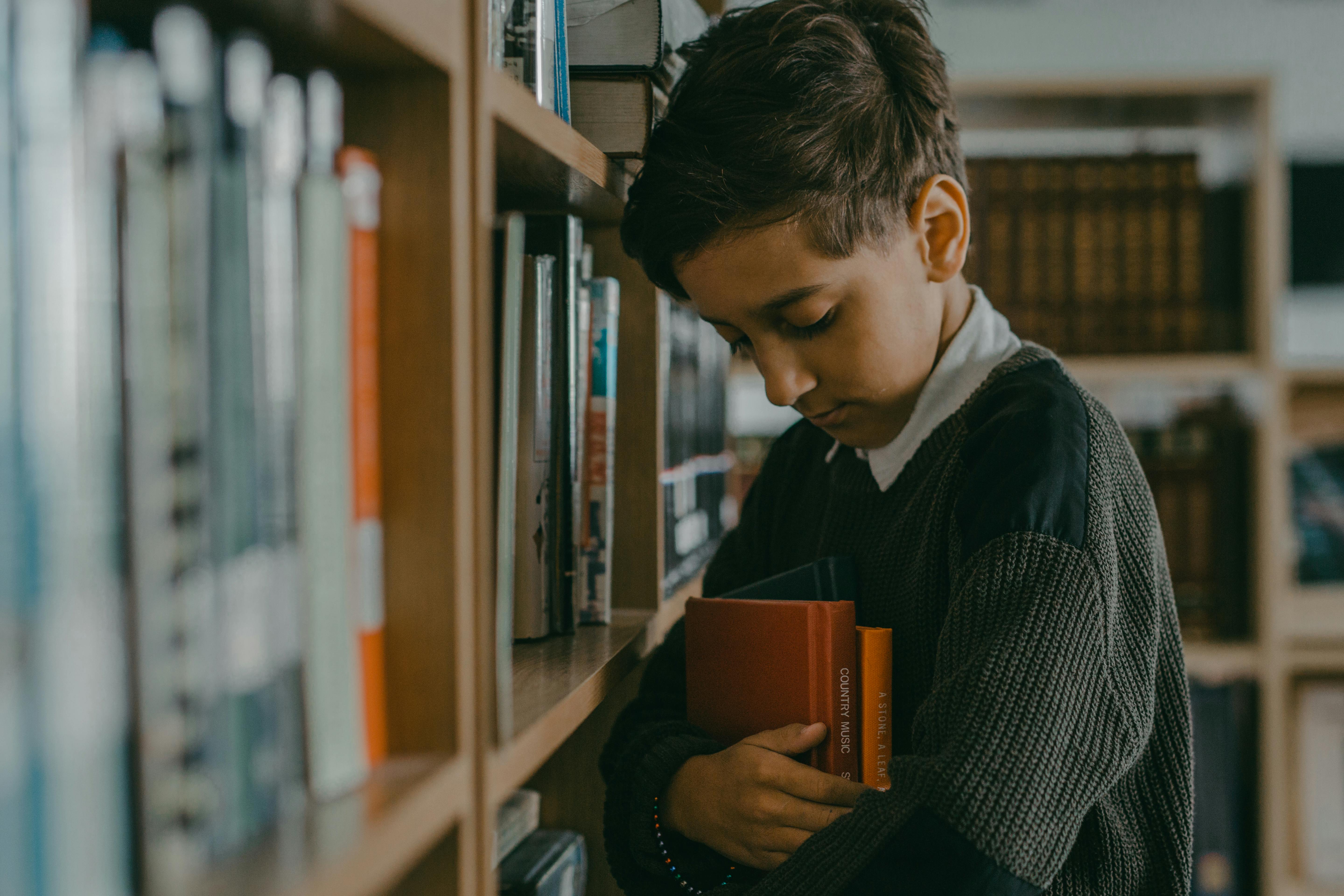 Little Boy in Library · Free Stock Photo