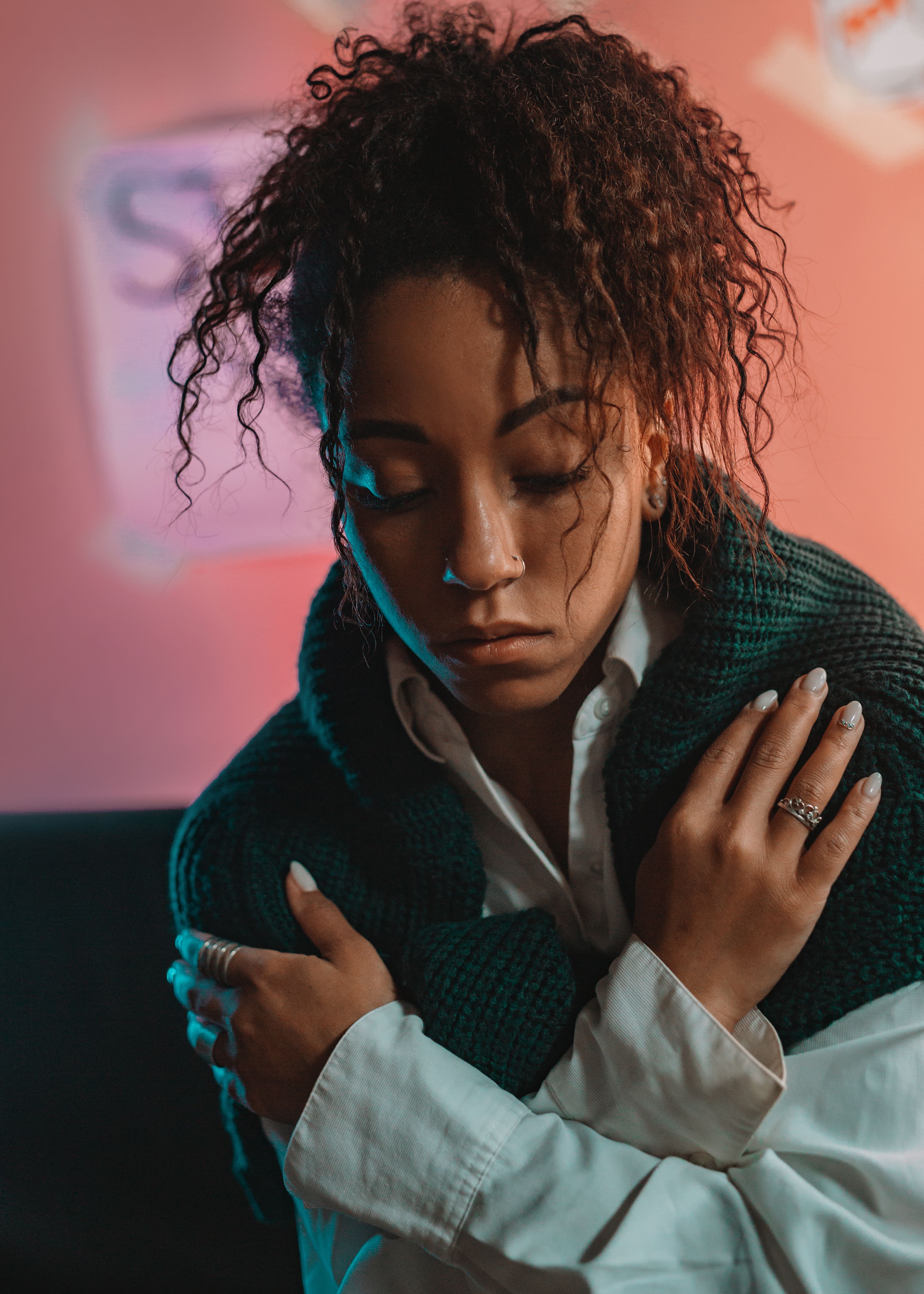 A Sad Woman in Green Knitted Sweater · Free Stock Photo