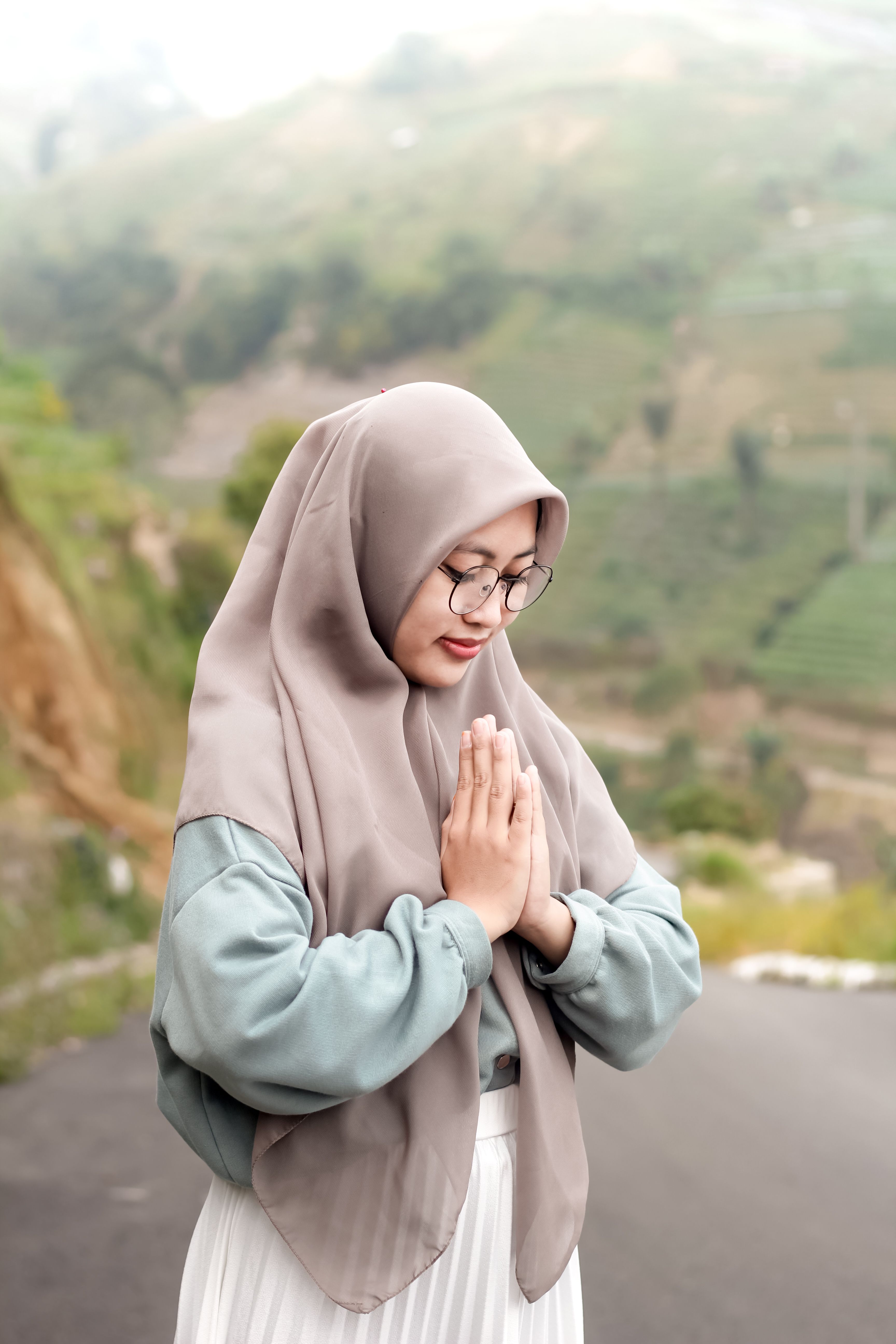A Woman in a Red Top Praying · Free Stock Photo