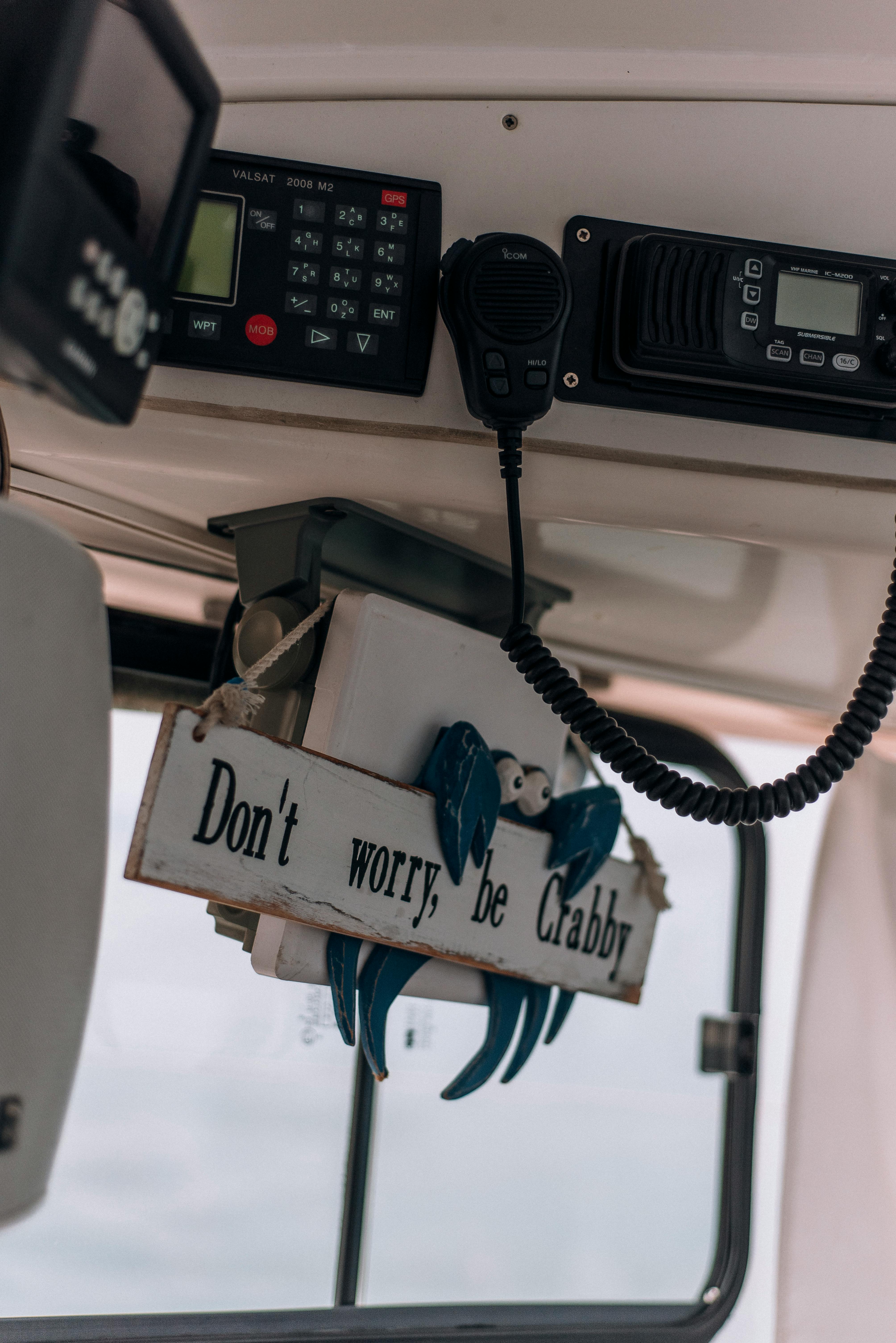 Man Navigating a Boat on Sea · Free Stock Photo