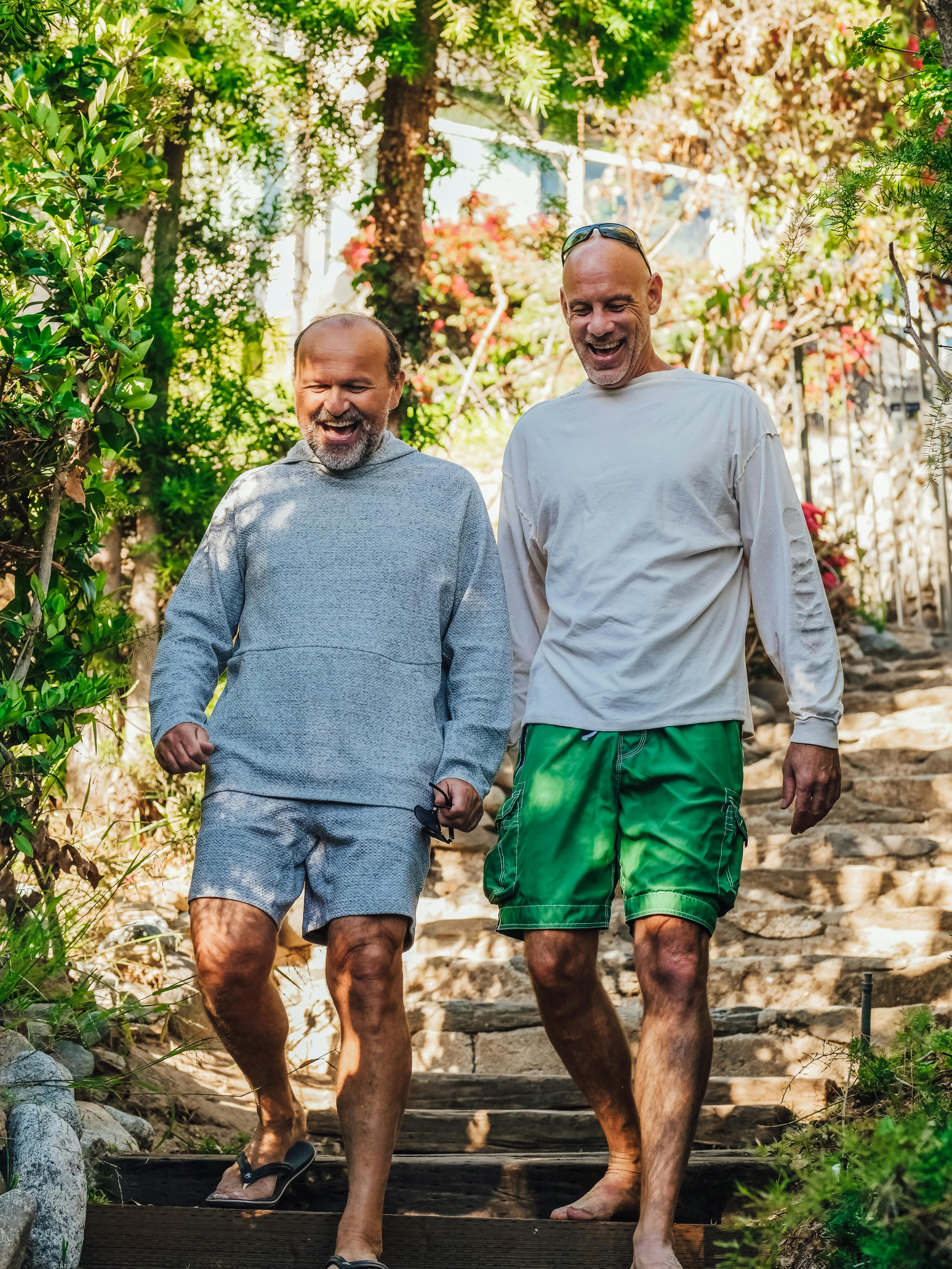 Two Men Walking Down the Stairs · Free Stock Photo