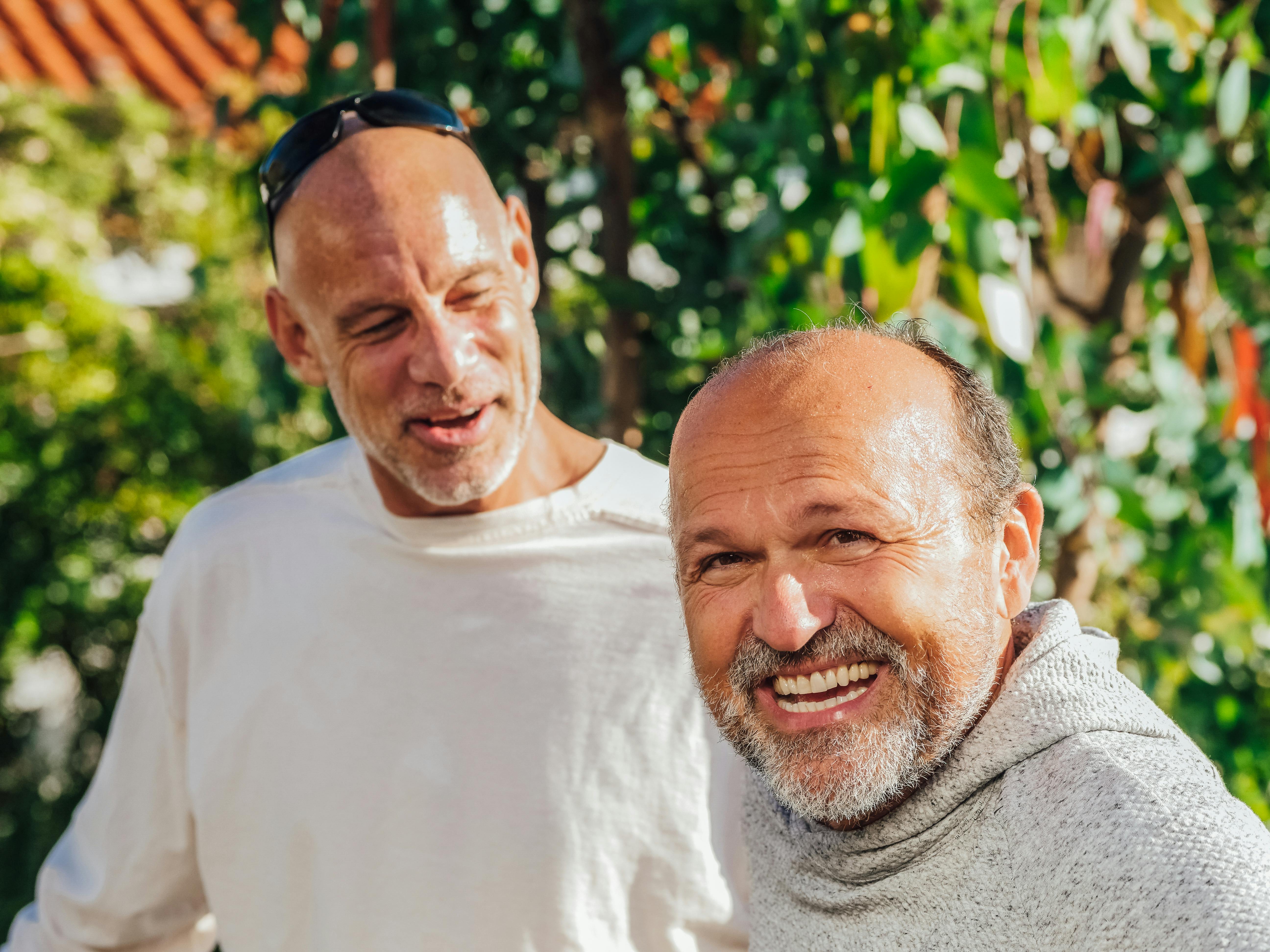 Two Men Laughing Together · Free Stock Photo