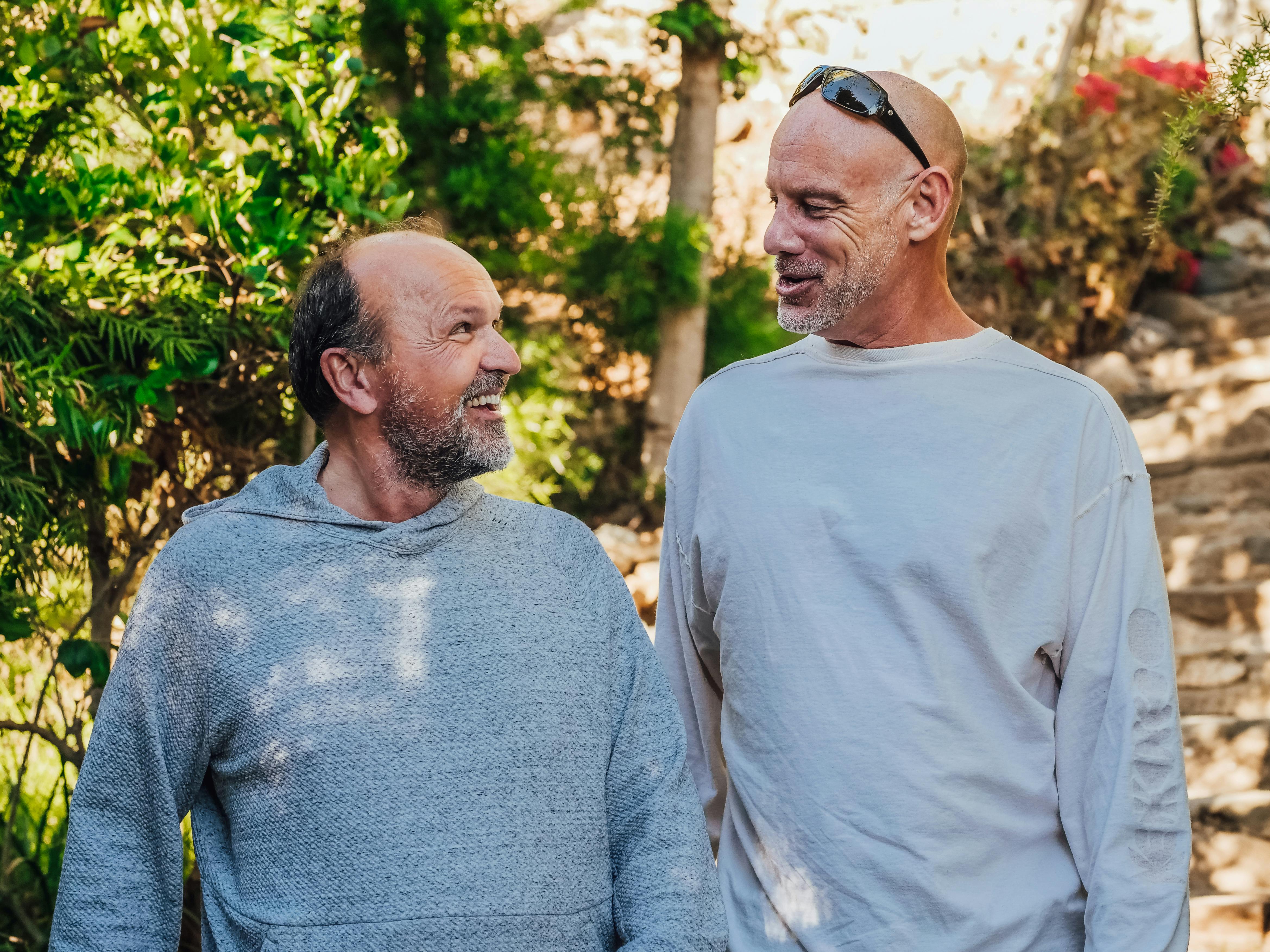 Two Men Looking at Each Other · Free Stock Photo