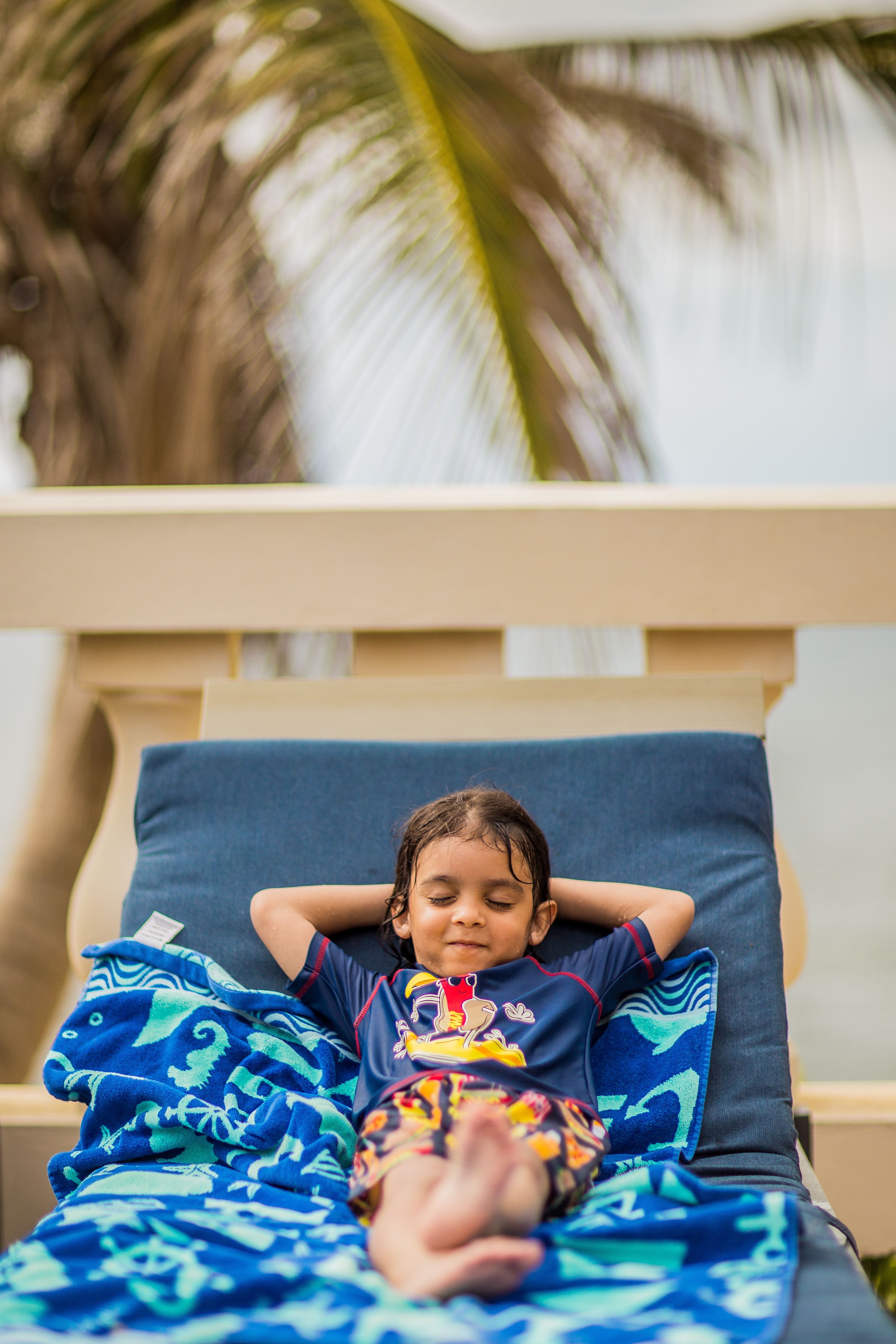 Woman Lying on White Sun Lounger · Free Stock Photo