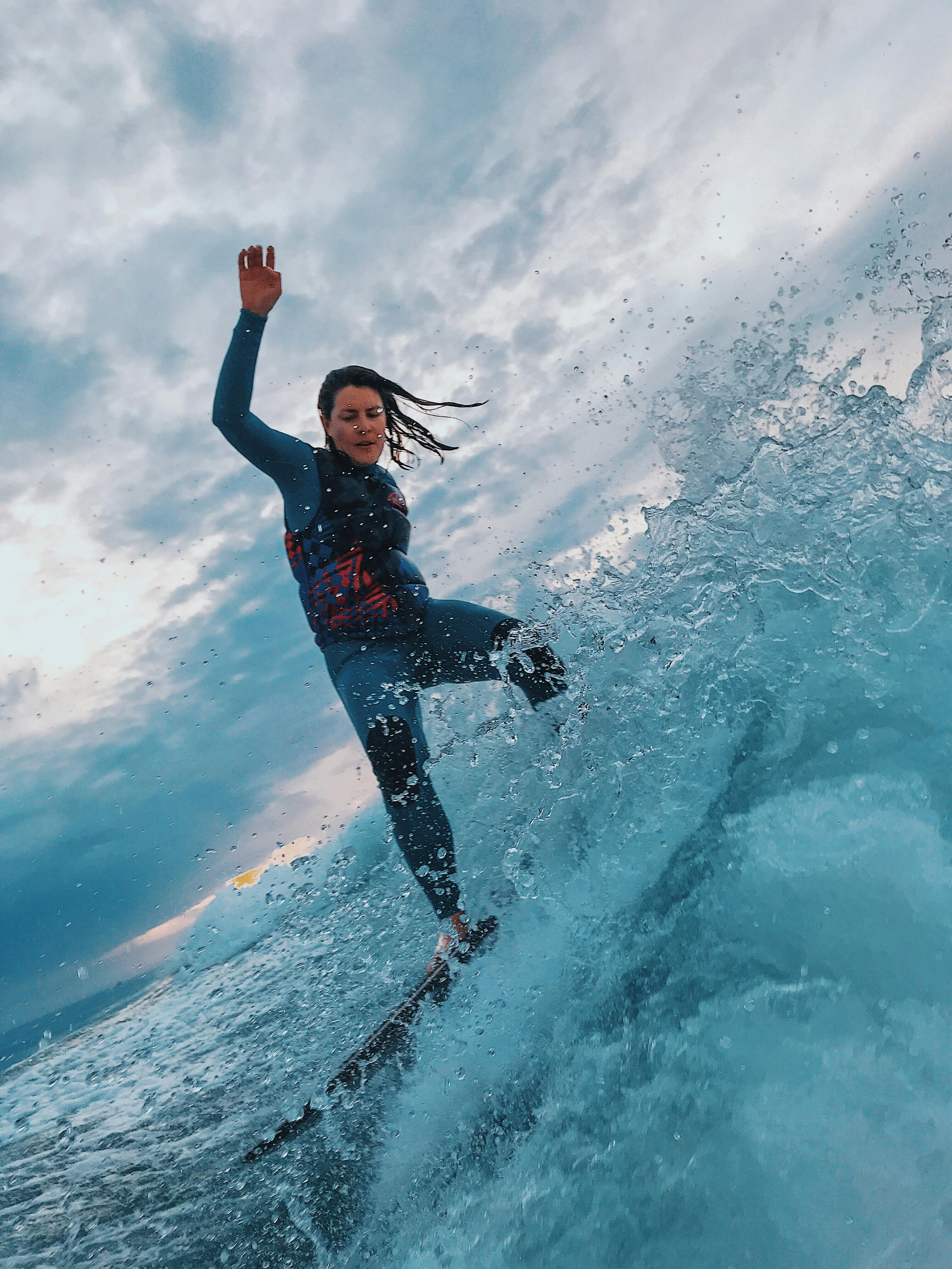 Person Surfing on the Beach · Free Stock Photo